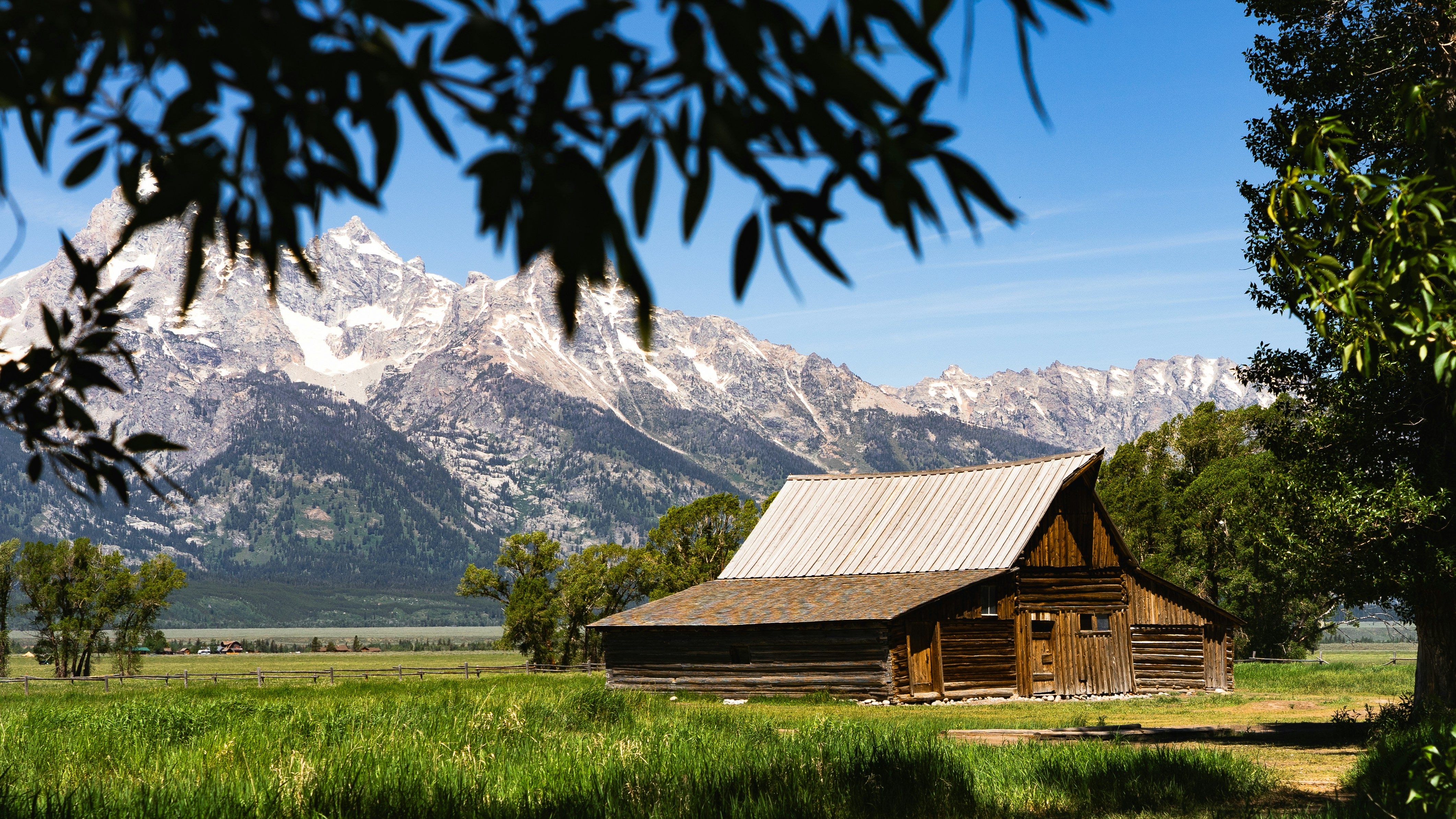 Rustic Charm Beneath Majestic Peaks