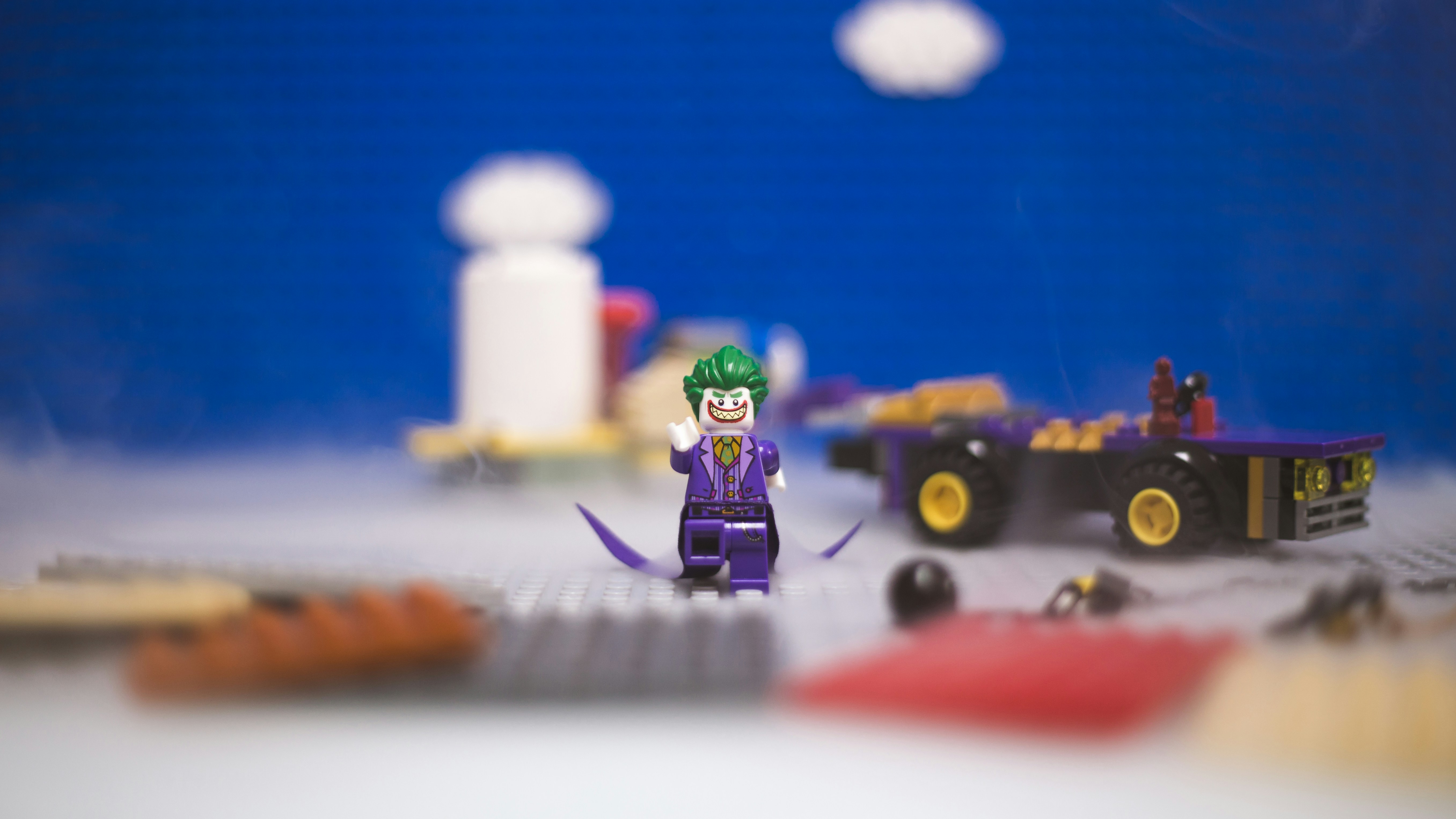 Lego Joker. Really Nice One. | A lego figure standing in front of a toy truck
