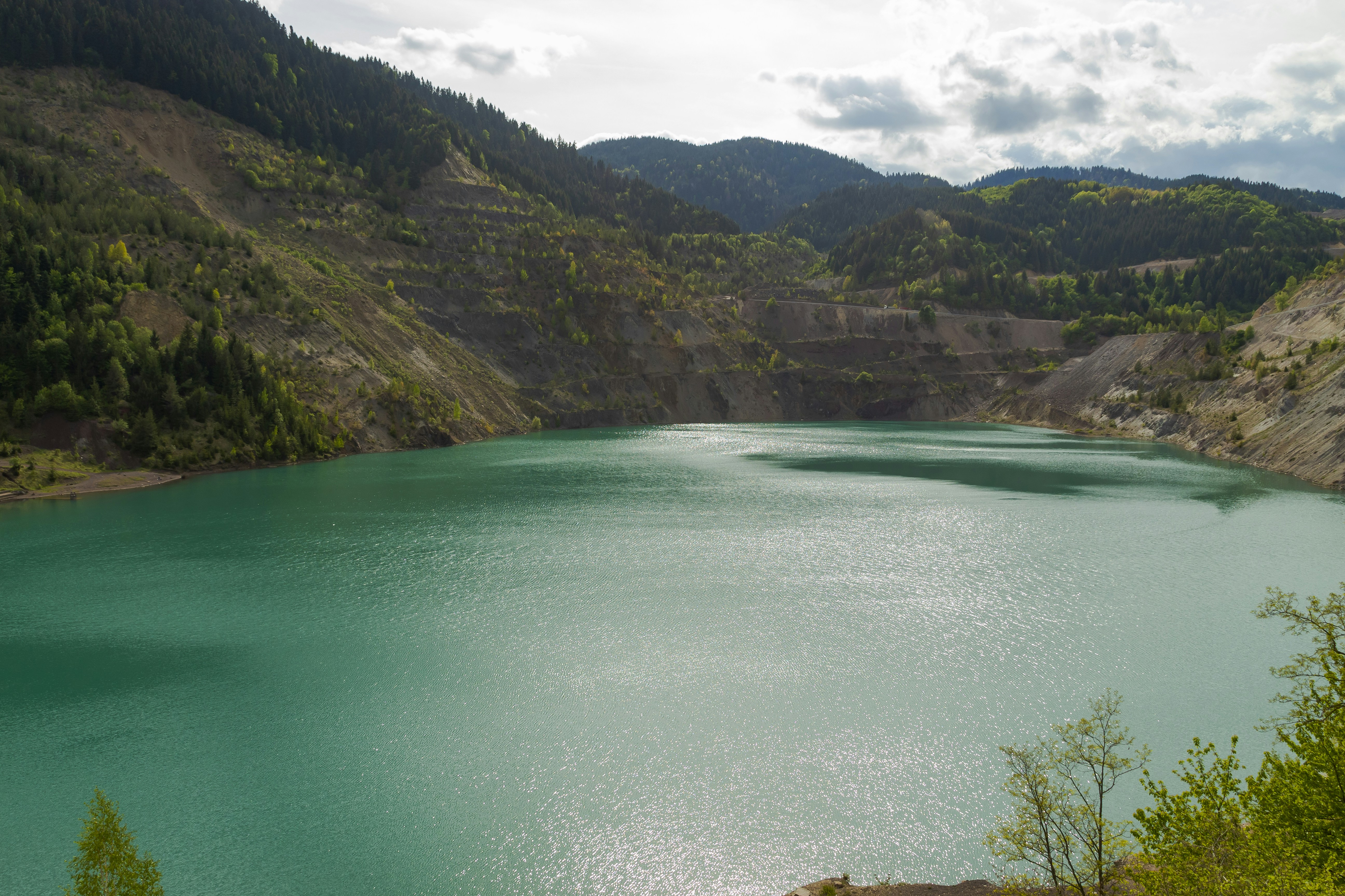 A large body of water surrounded by mountains photo – Free Vareš Image ...