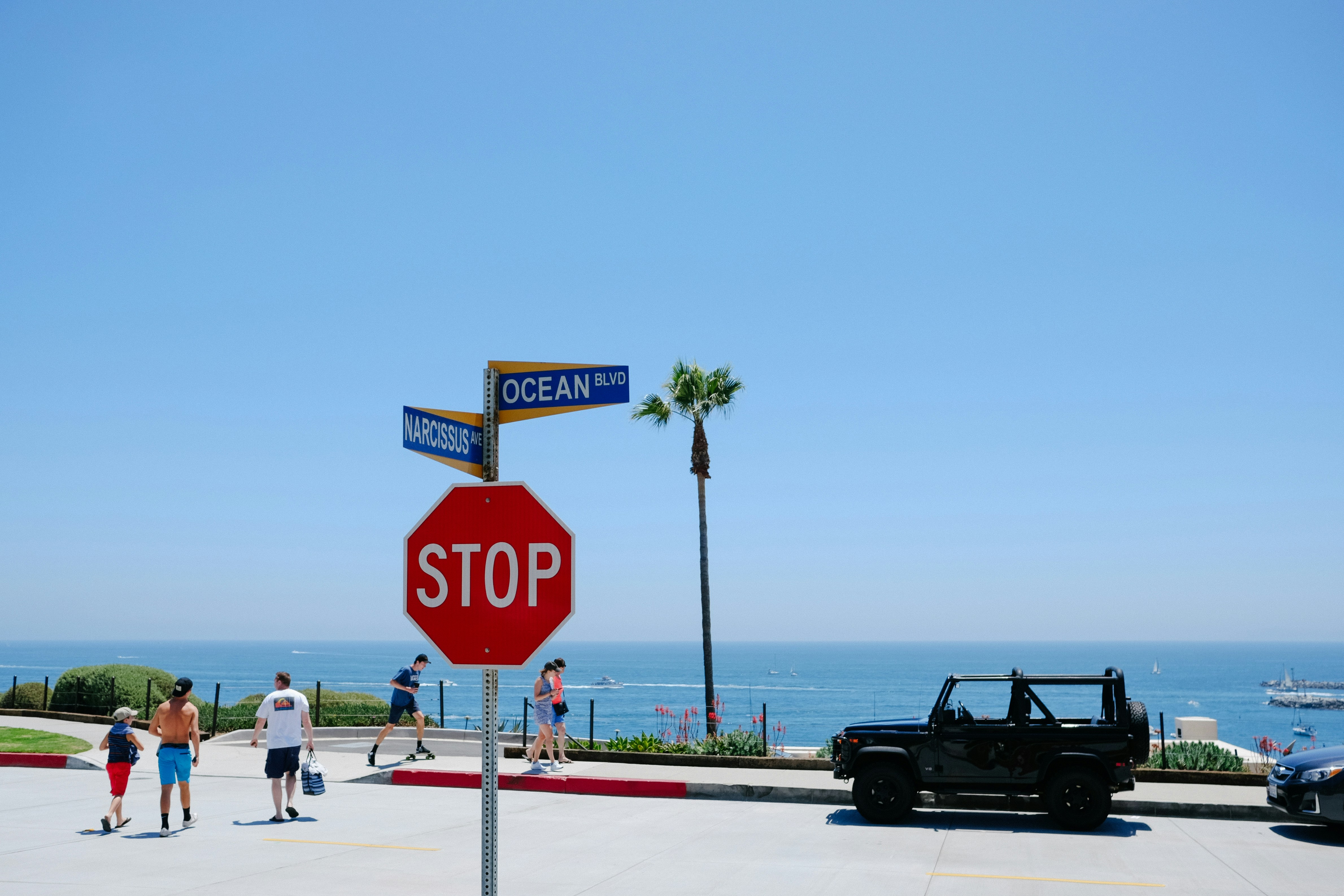 Seaside Crossroads: A Moment by the Ocean