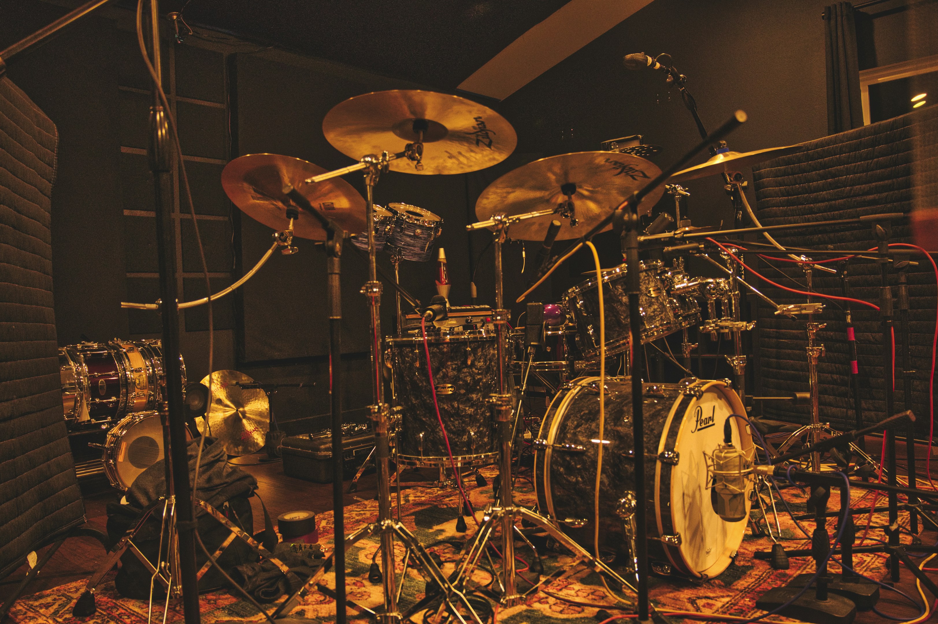 A drum set up in a recording studio photo – Free Man Image on Unsplash