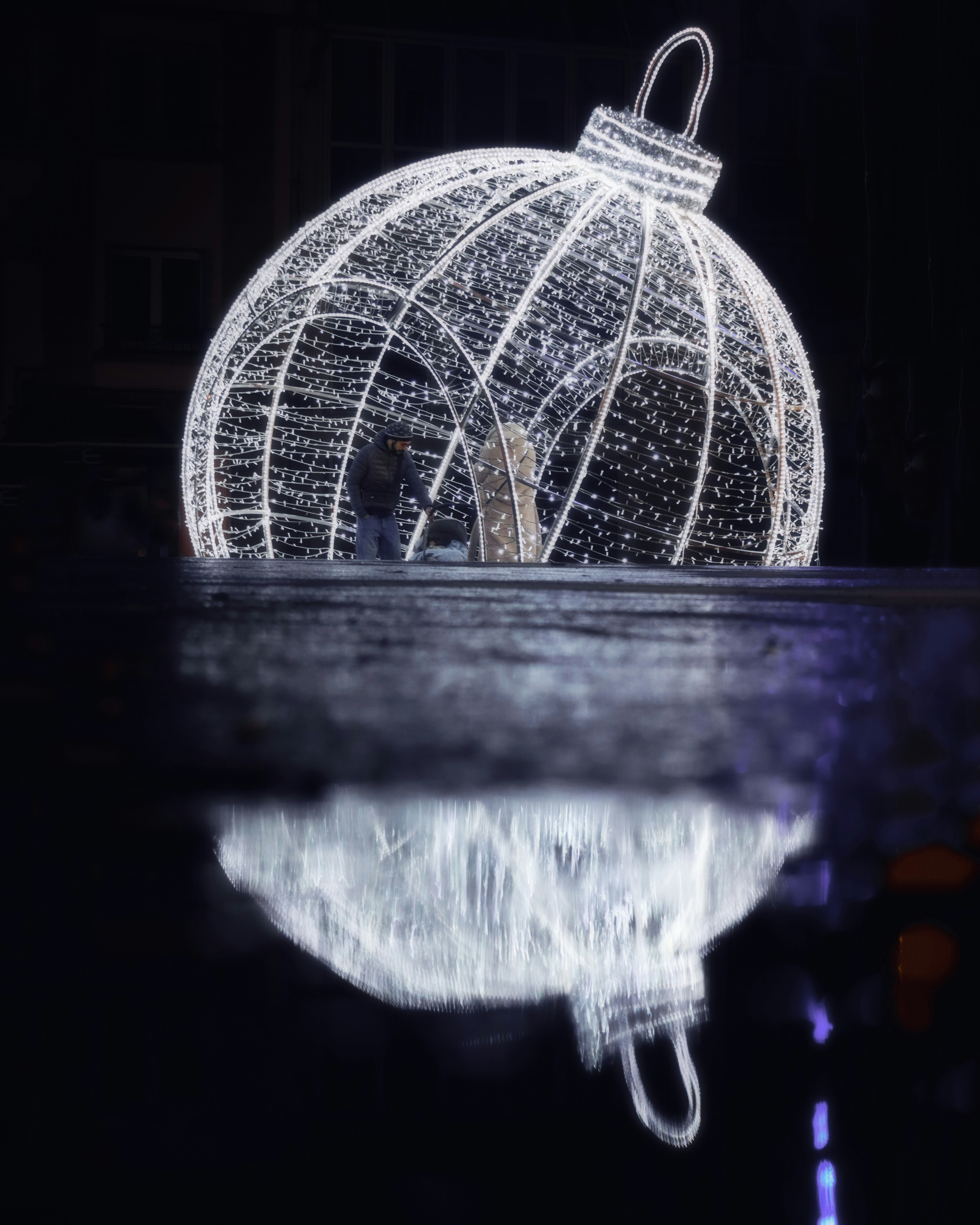 Illuminated Ornament: A Quiet Moment Inside the Glass Sphere