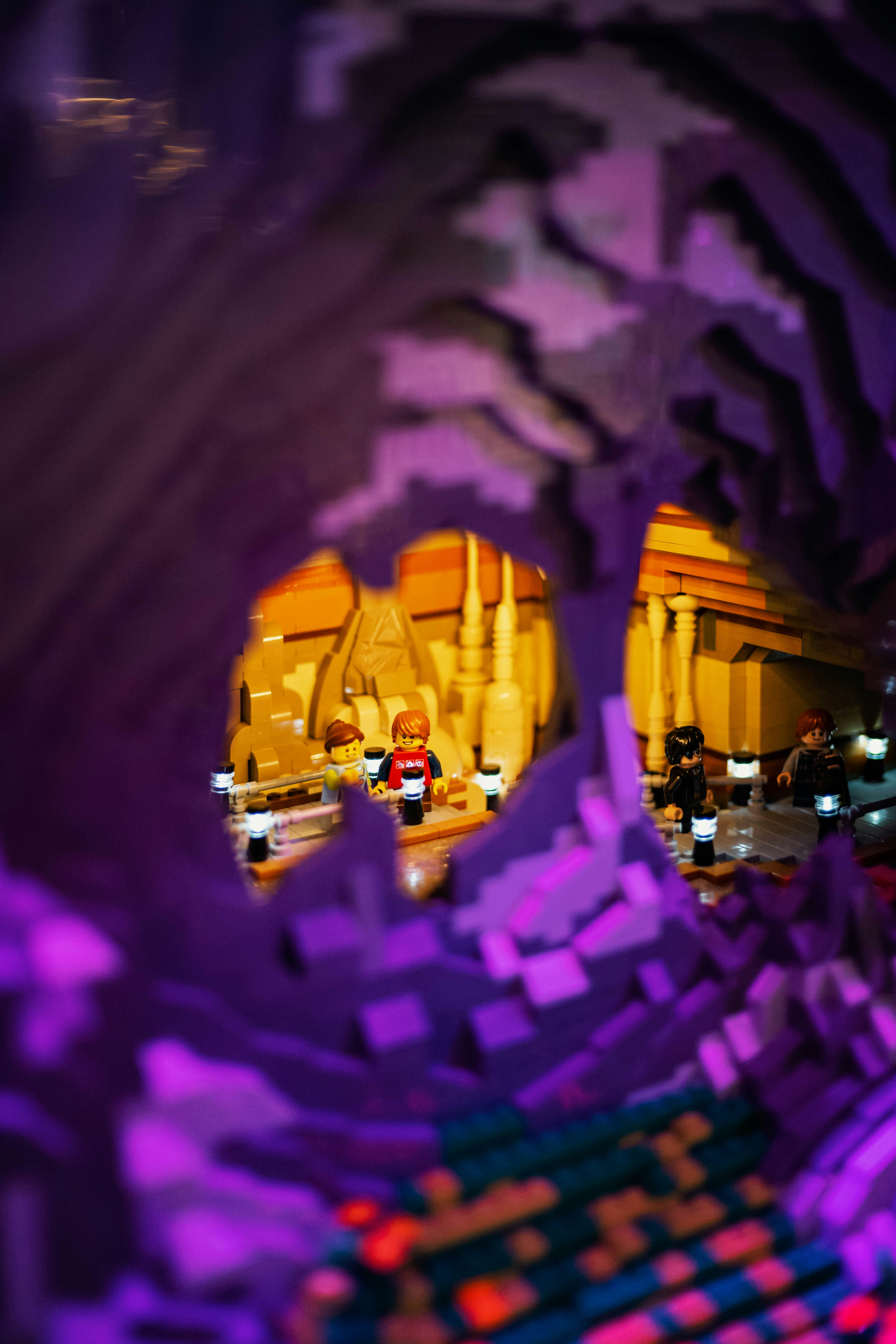 Lego Quarry Assembly: Mini Figures Beneath Violet Caverns