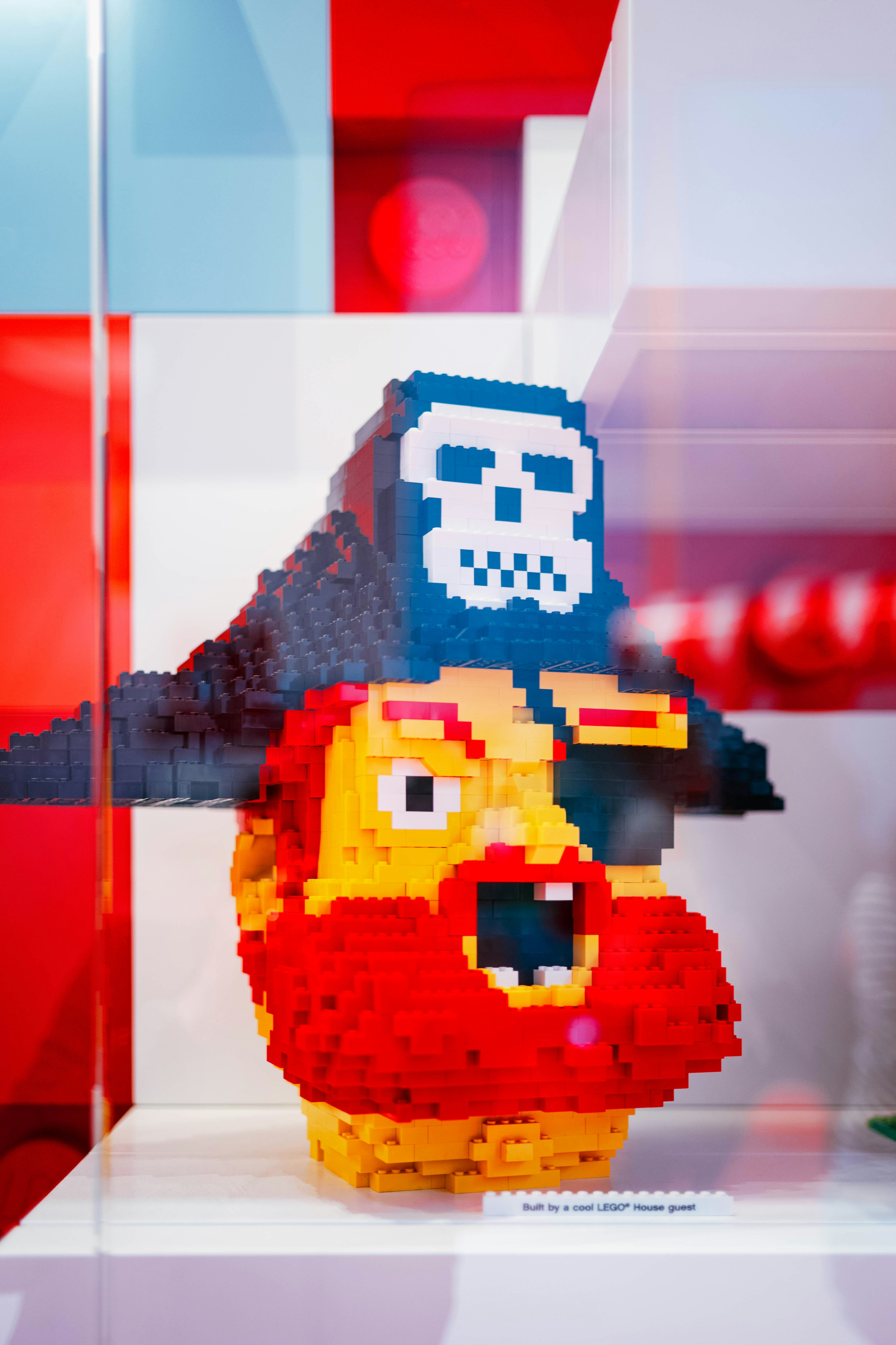 Neon Glasscase Primate: A LEGO Monkey with a Skull Crest