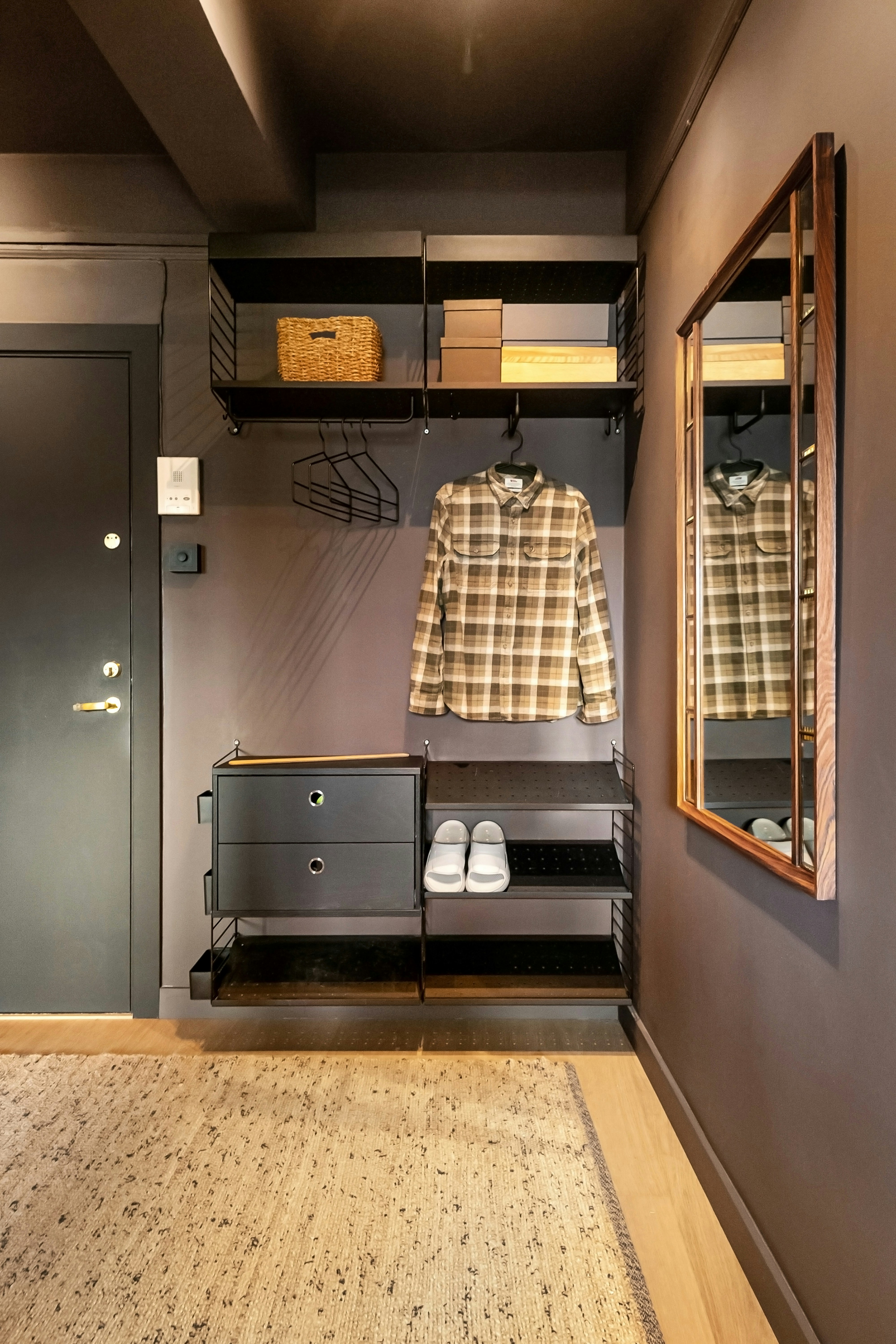 A walk in closet with a bench and mirror photo – Free Floor Image on ...