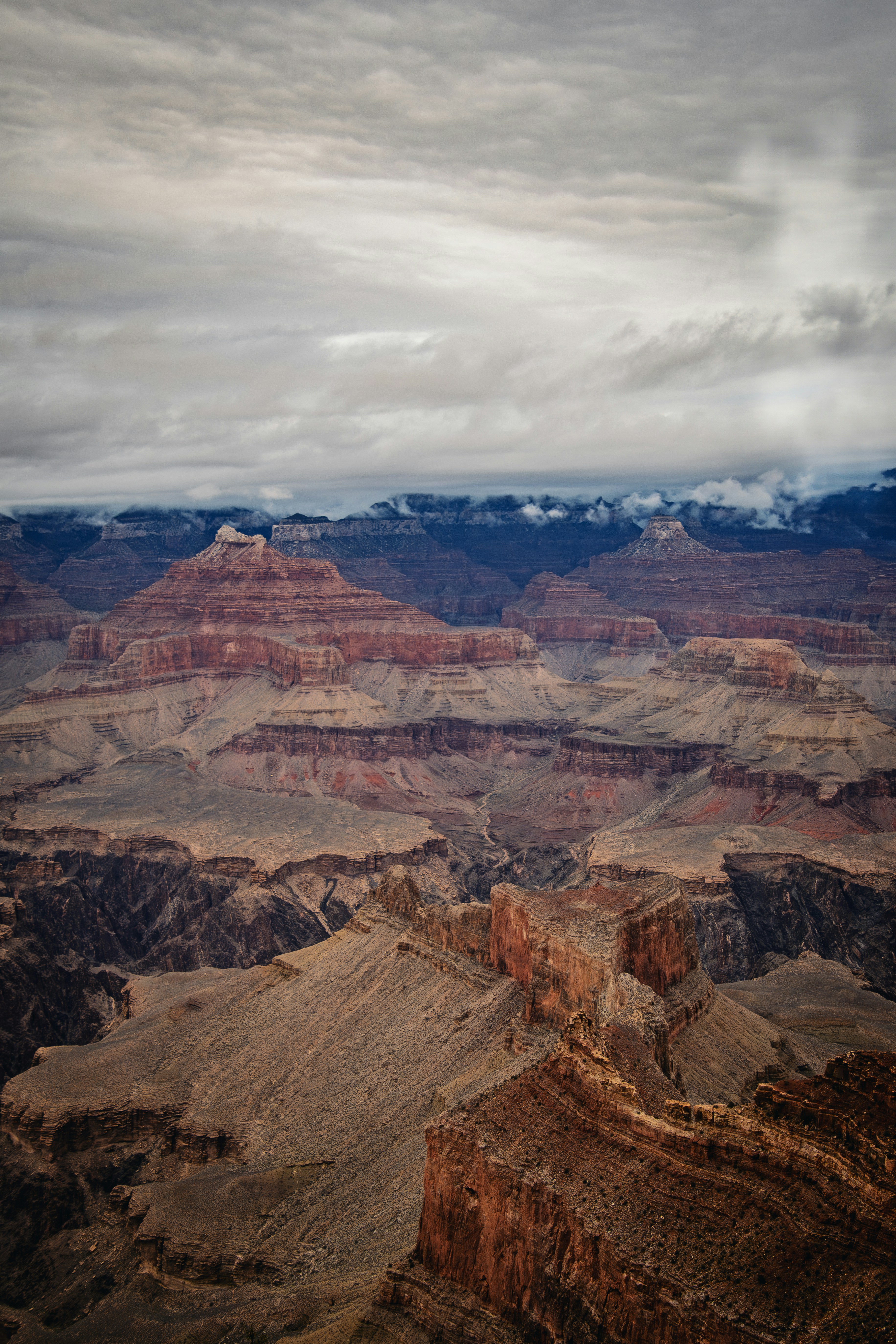 A view of the grand canyon from the rim of a cliff photo – Free Grand ...