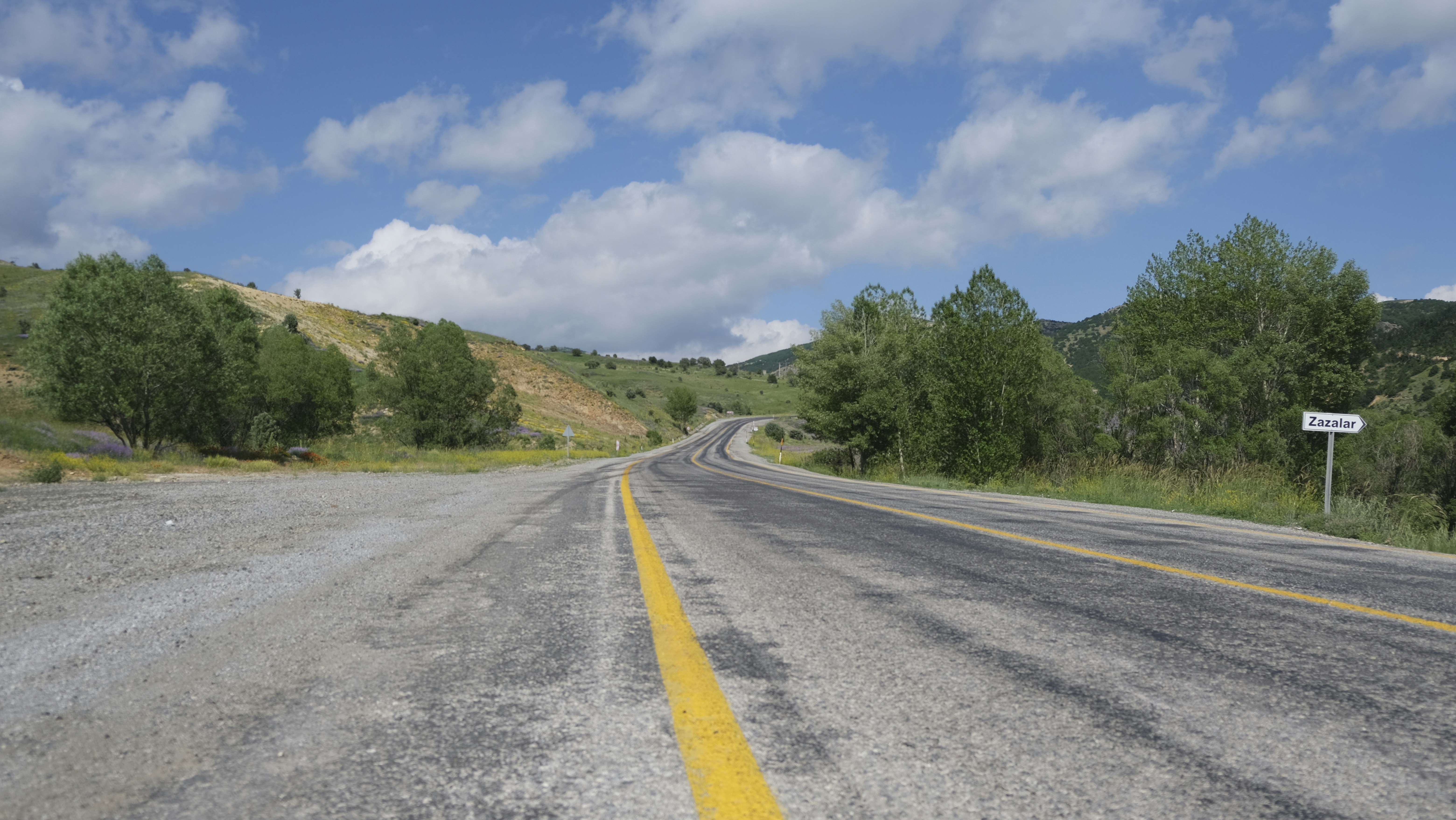 Horizon Bound: The Road’s Quiet Arc Through Open Terrain