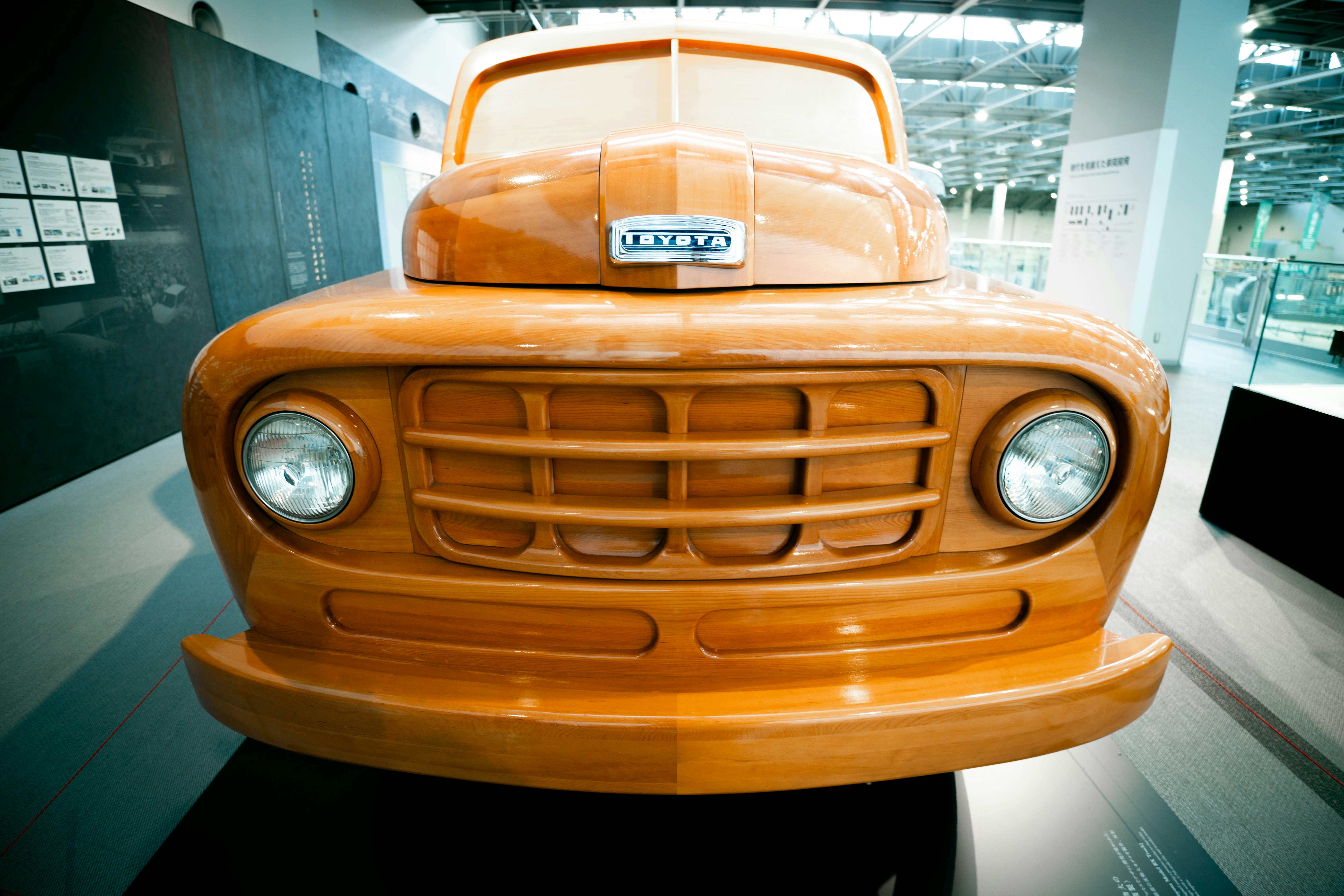 Vintage Orange Truck in Museum Spotlight
