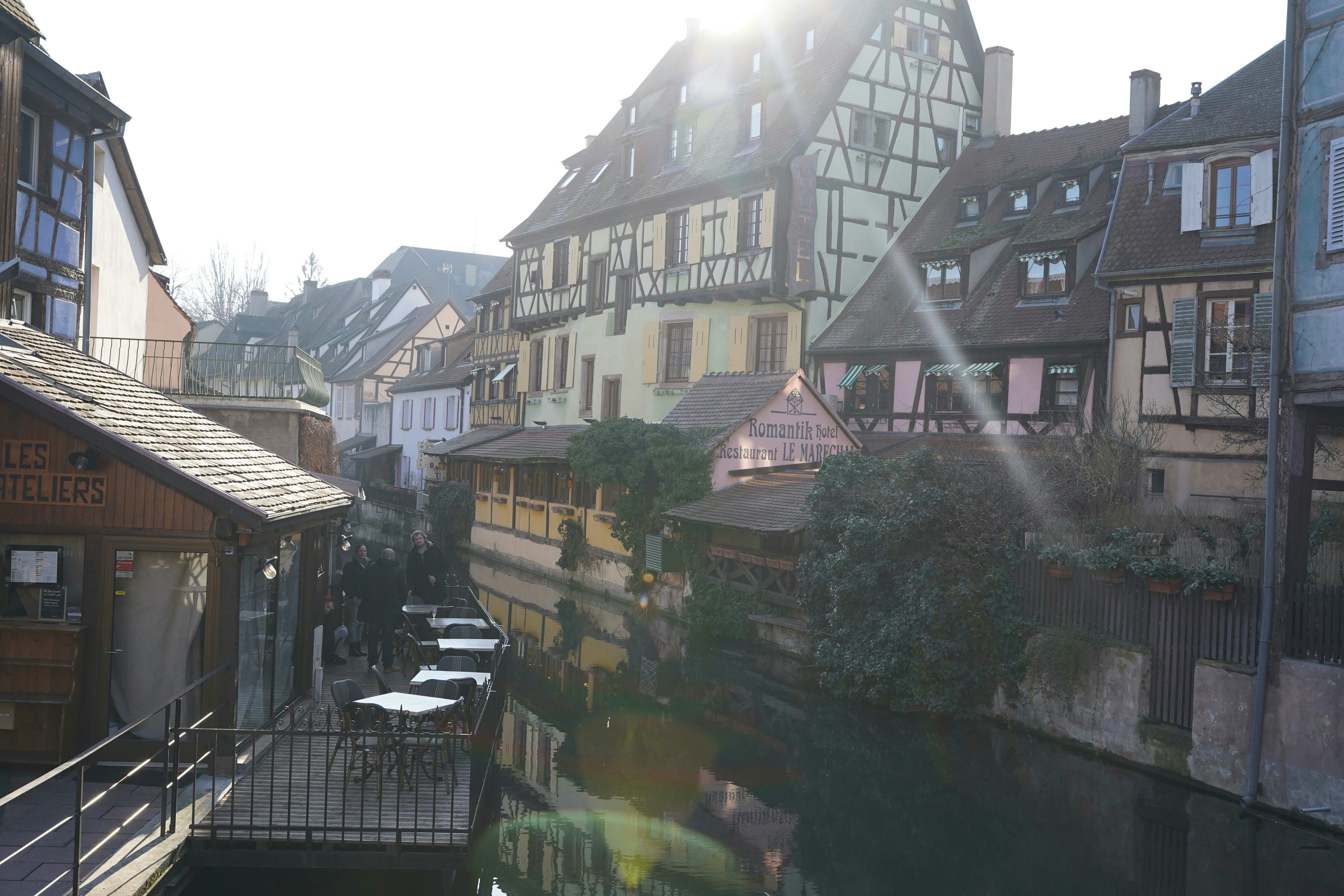 Sunlit Facades Along a Tranquil Canal