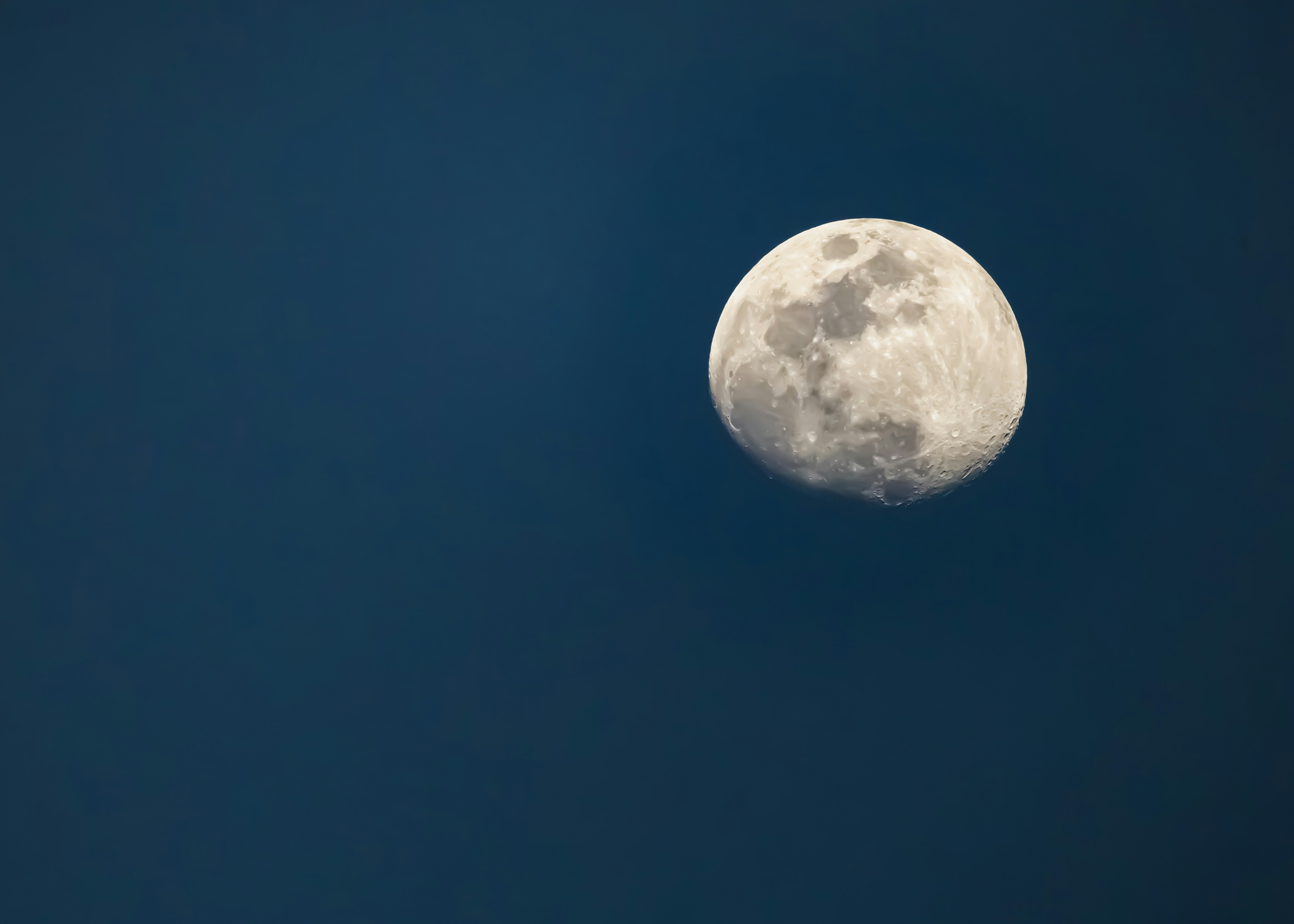 A full moon in a dark blue sky photo – Free Moon Image on Unsplash