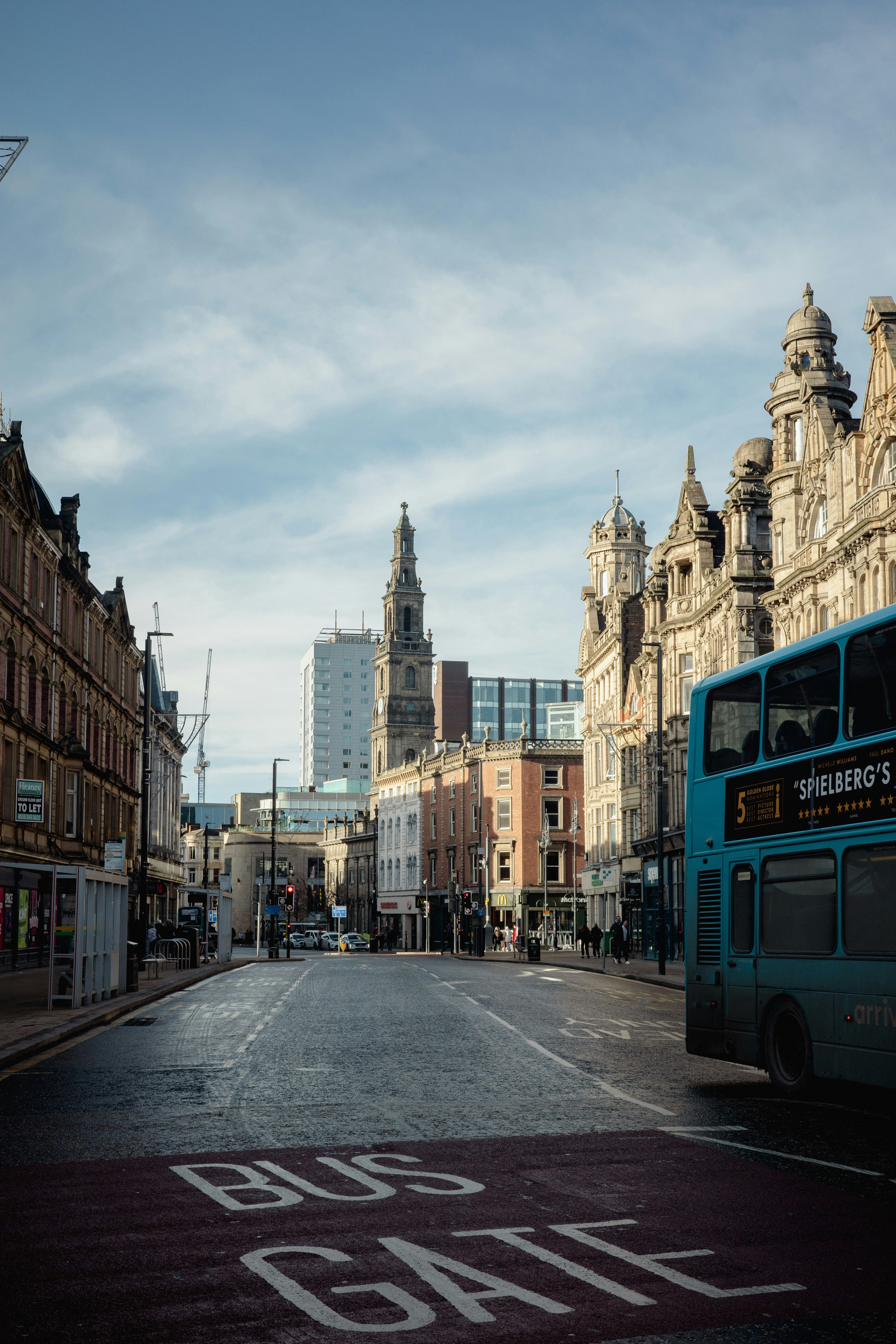 A blue double decker bus driving down a street photo – Free Leeds Image ...