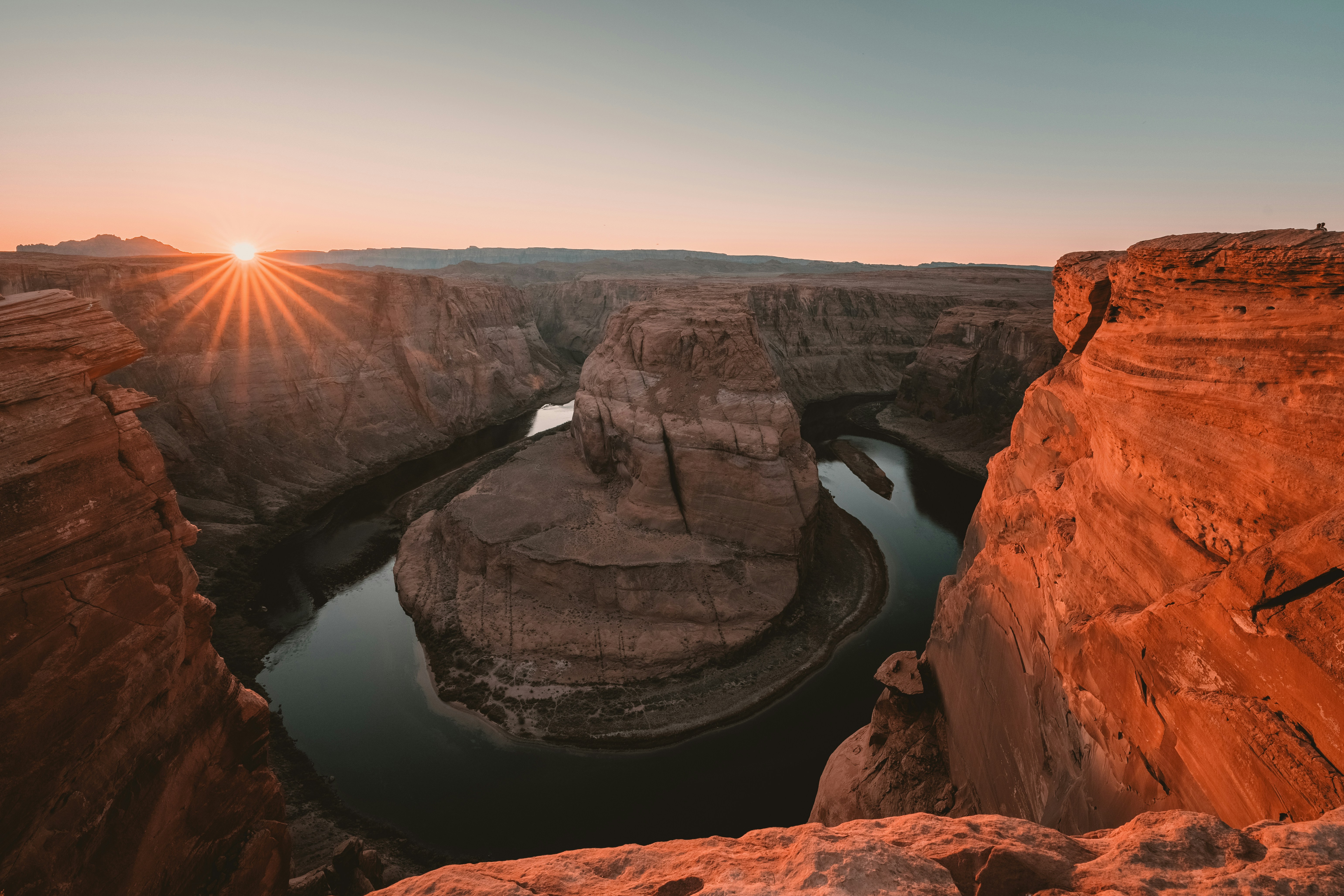 The sun is setting over a canyon in the desert photo – Free Horseshoe ...