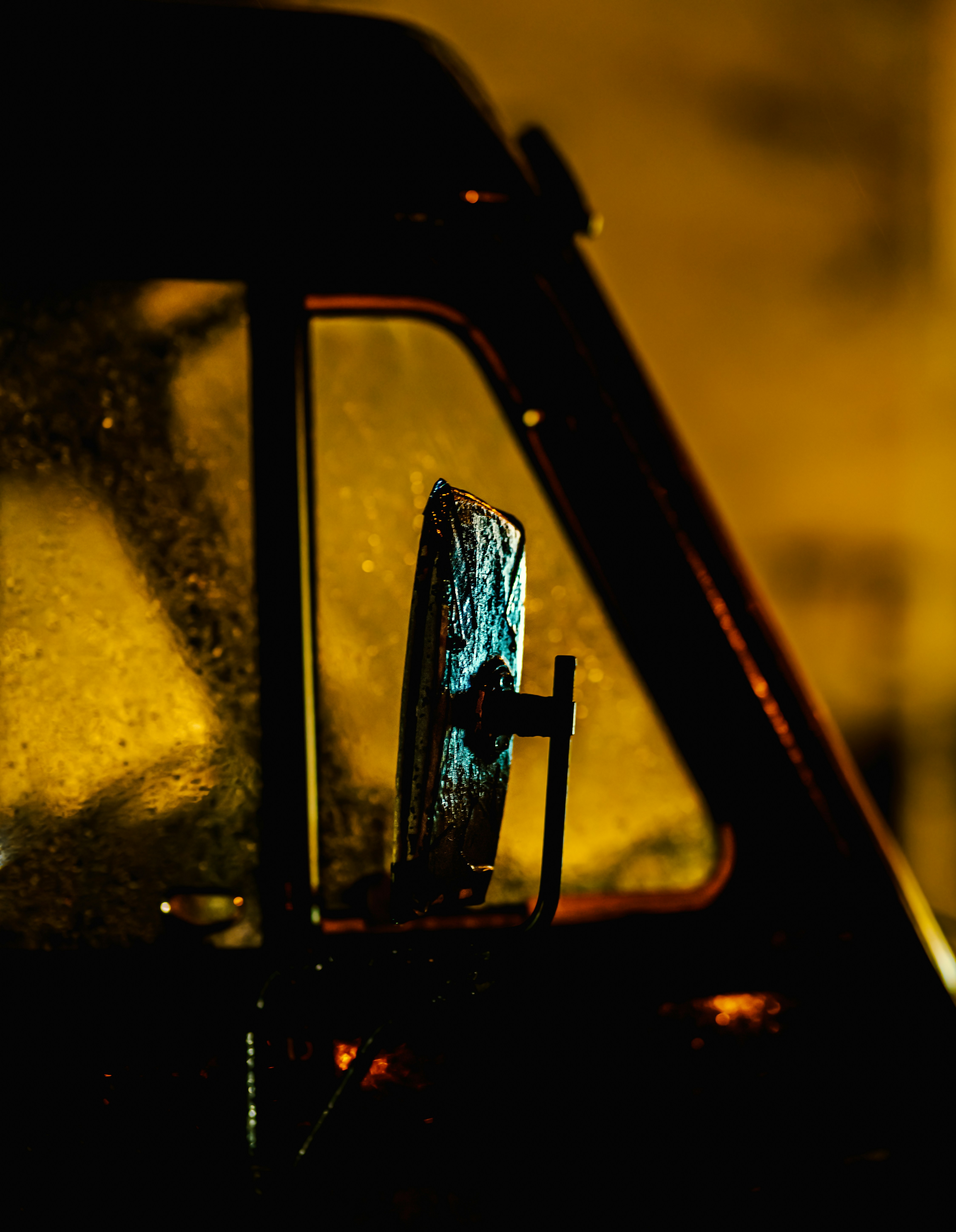 Glowing Mirror in the Driver’s Door: A Night Standoff with Neon Warmth