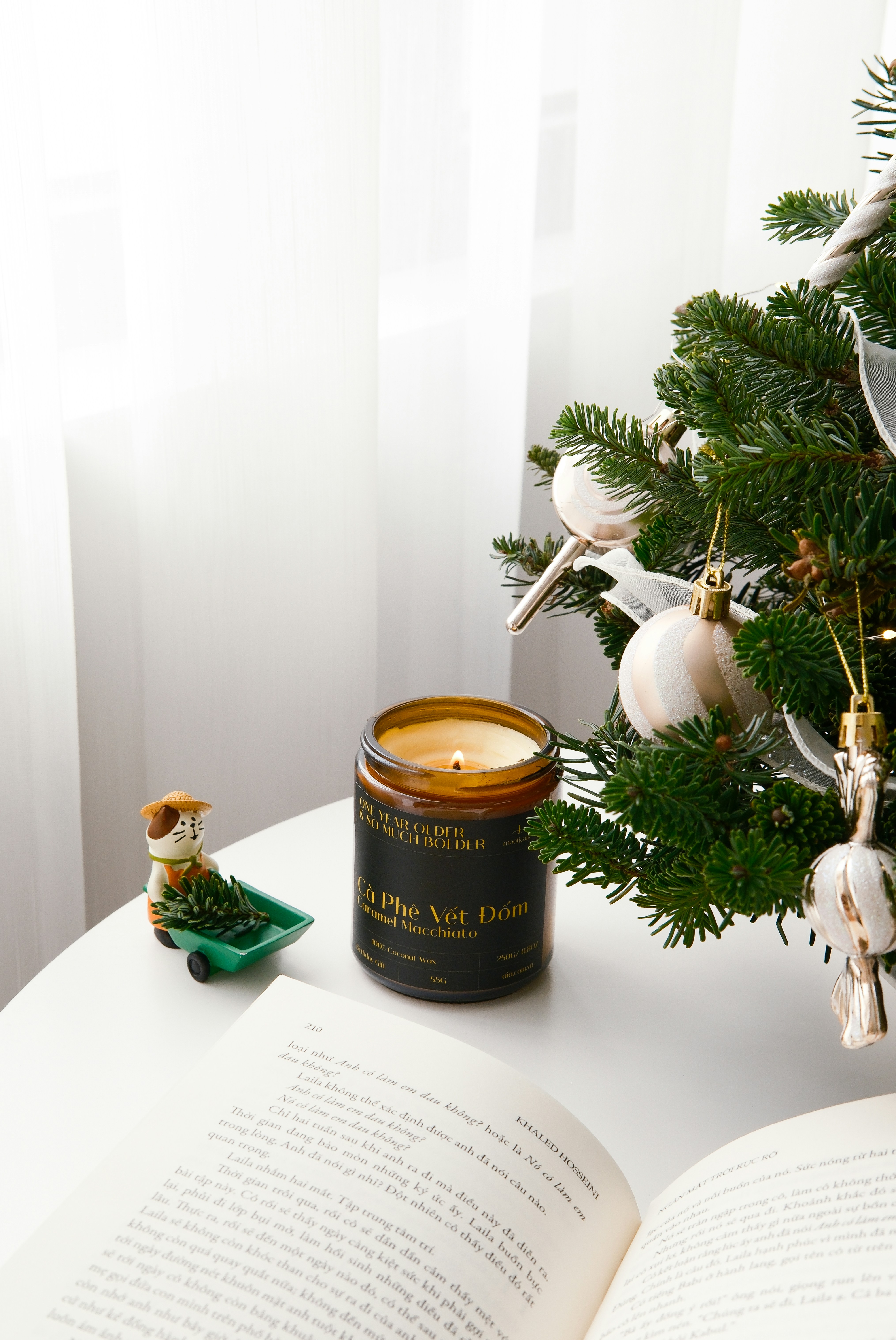 Glow on the White Desk: Candlelight, Pine, and Pages