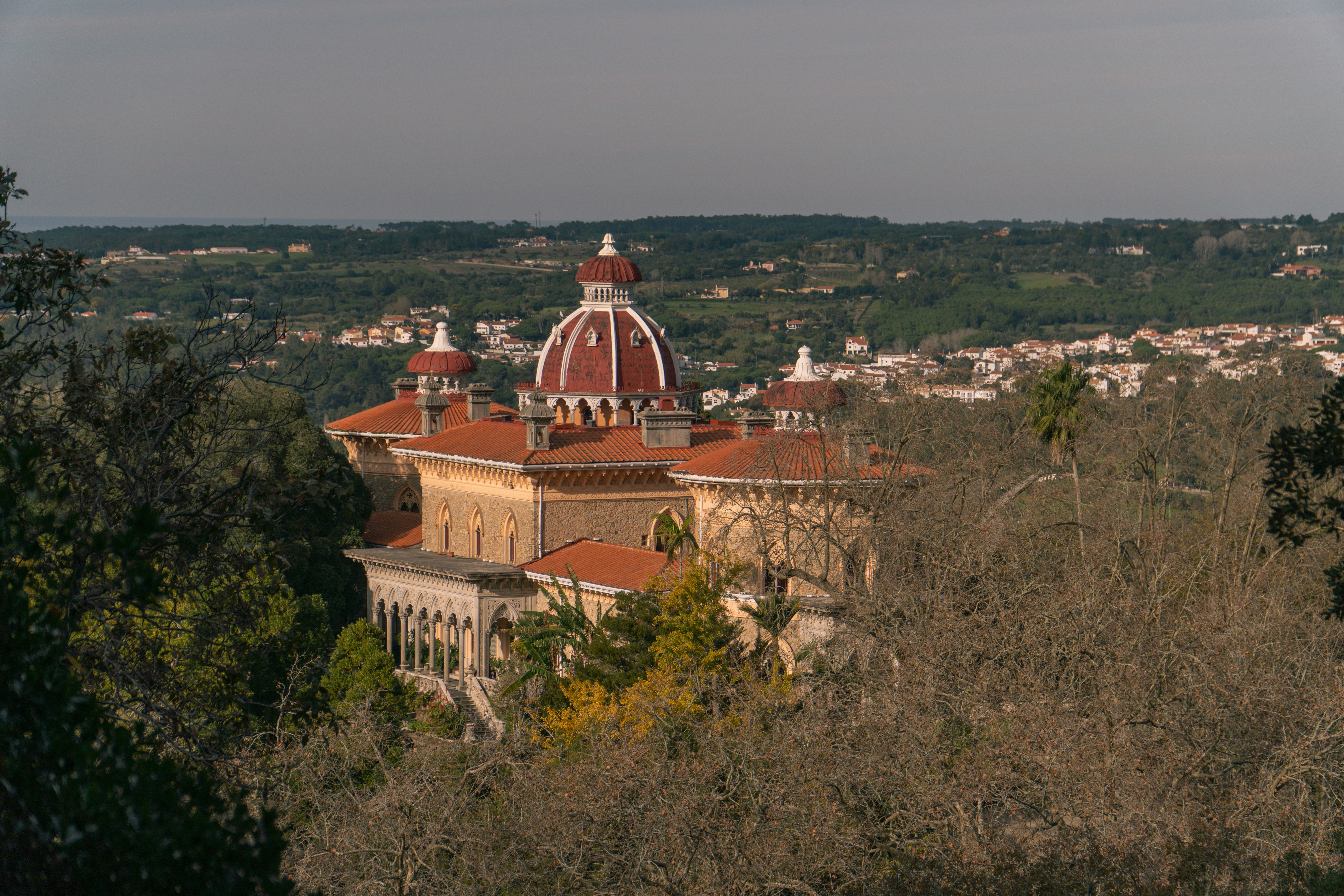 Ornate Architecture Amidst Verdant Hills