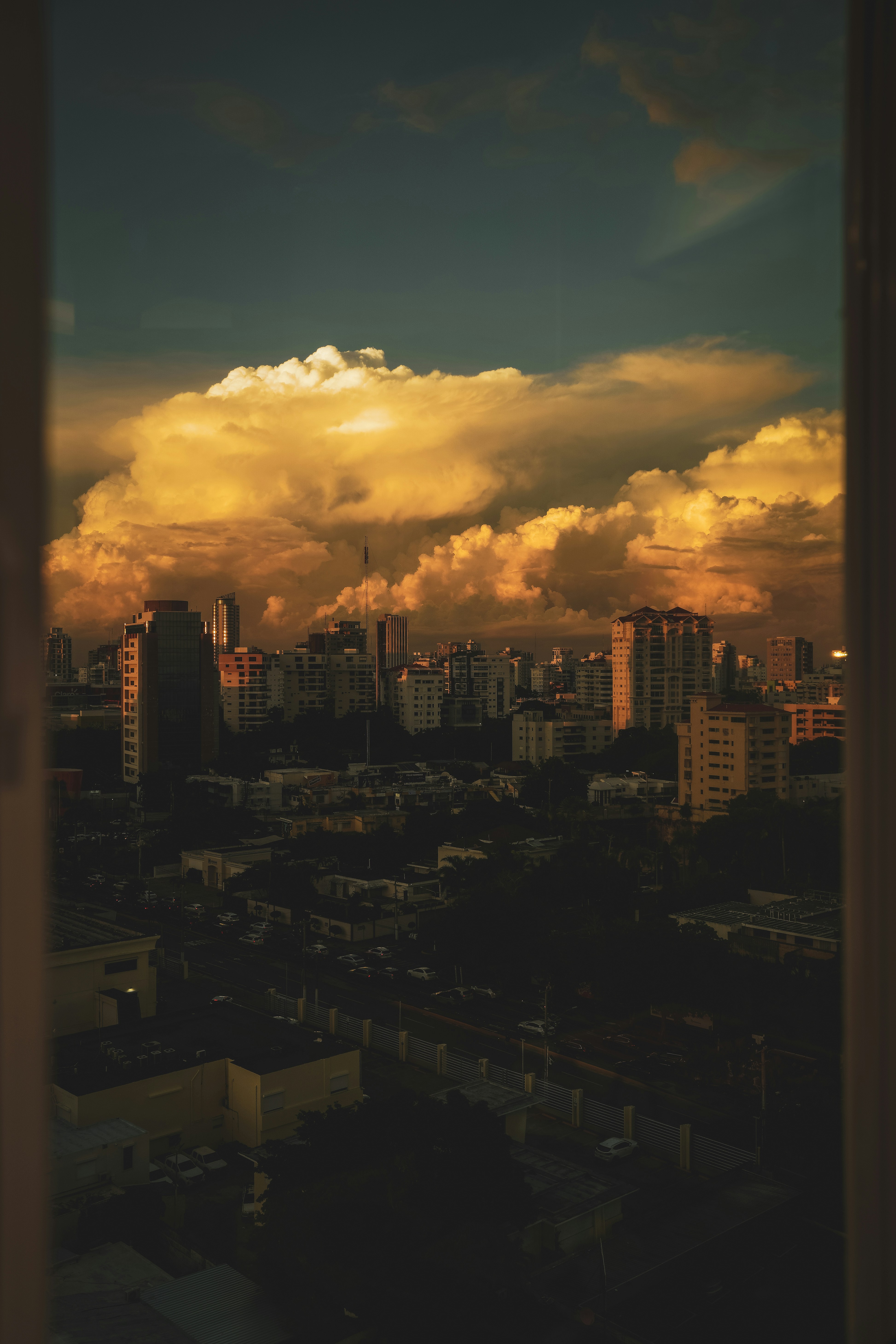 Golden Cloud Crown Over a Quiet Urban Horizon