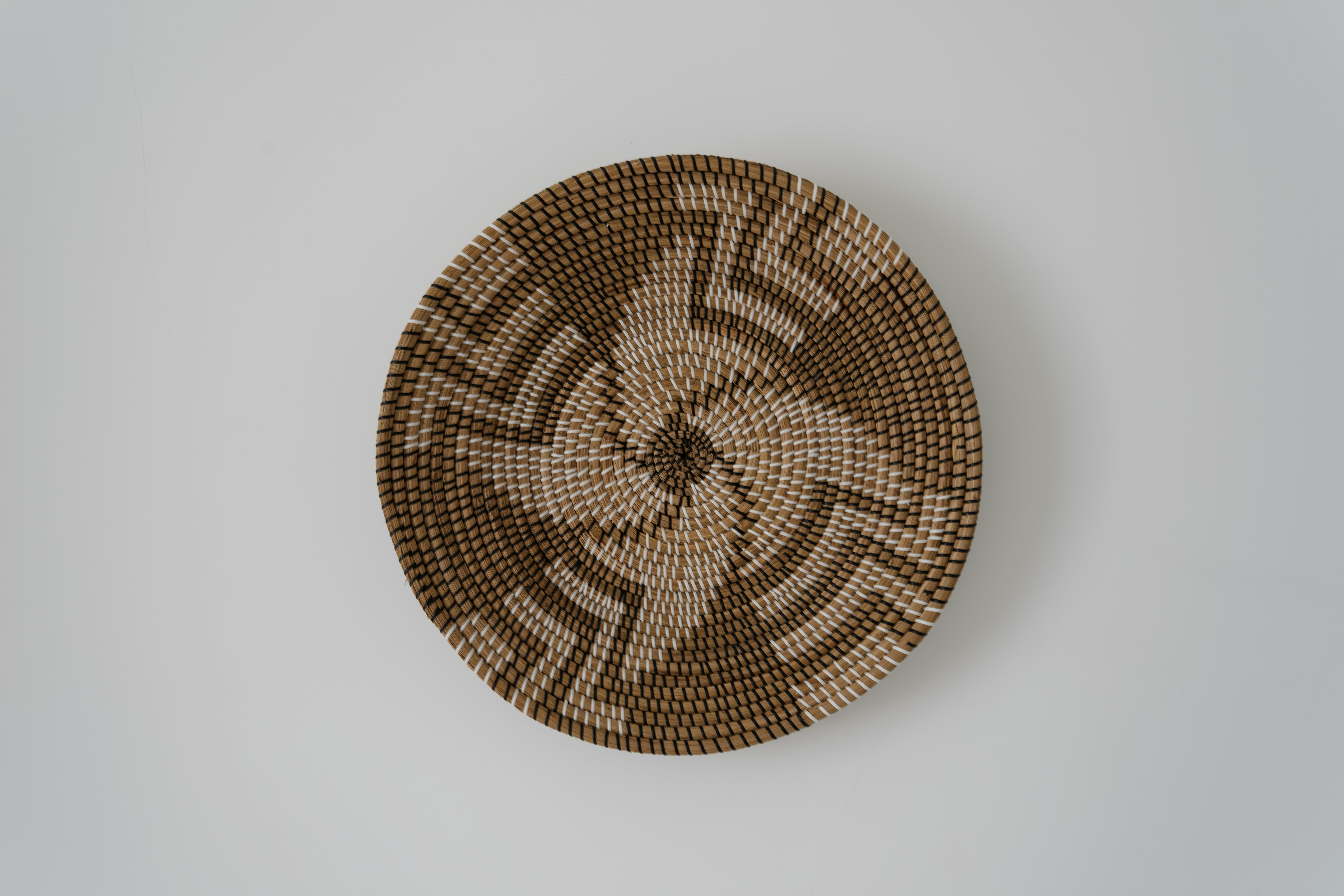 A brown and white plate sitting on top of a table photo – Free Texture ...