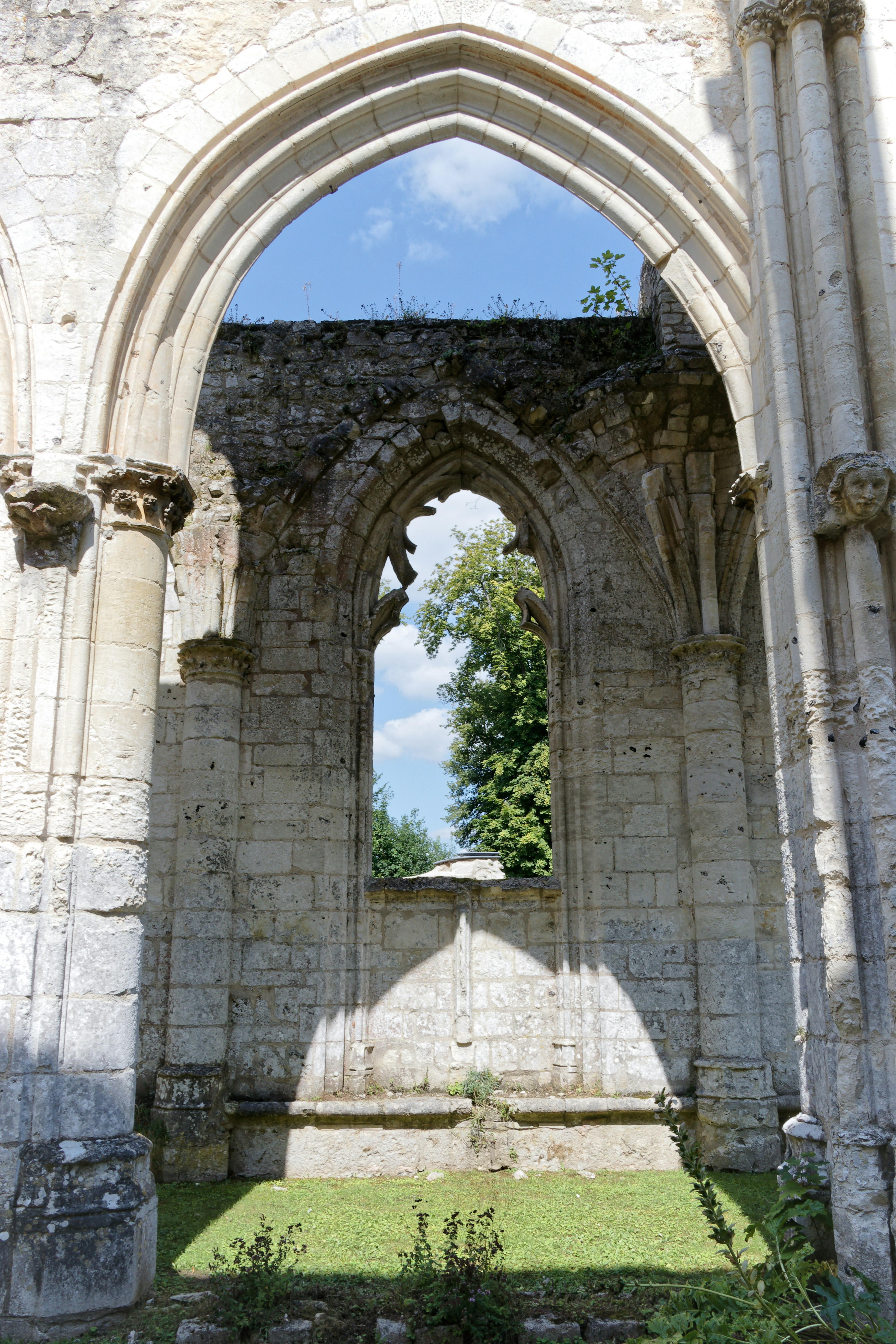 Azure Sky Framed by Ruined Gothic Archways