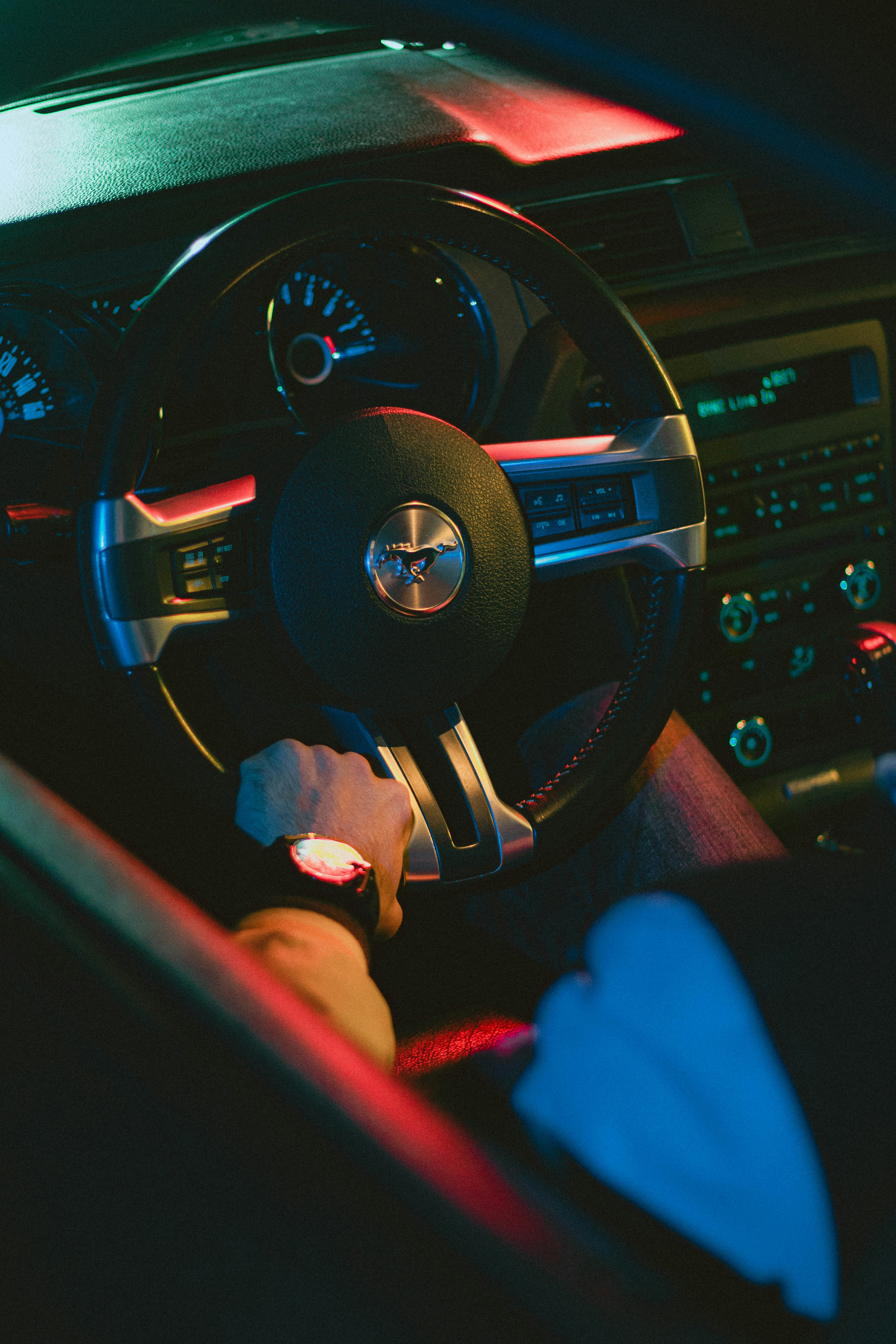 Neon Pulse at the Wheel: A Mustang Nighttime Cockpit