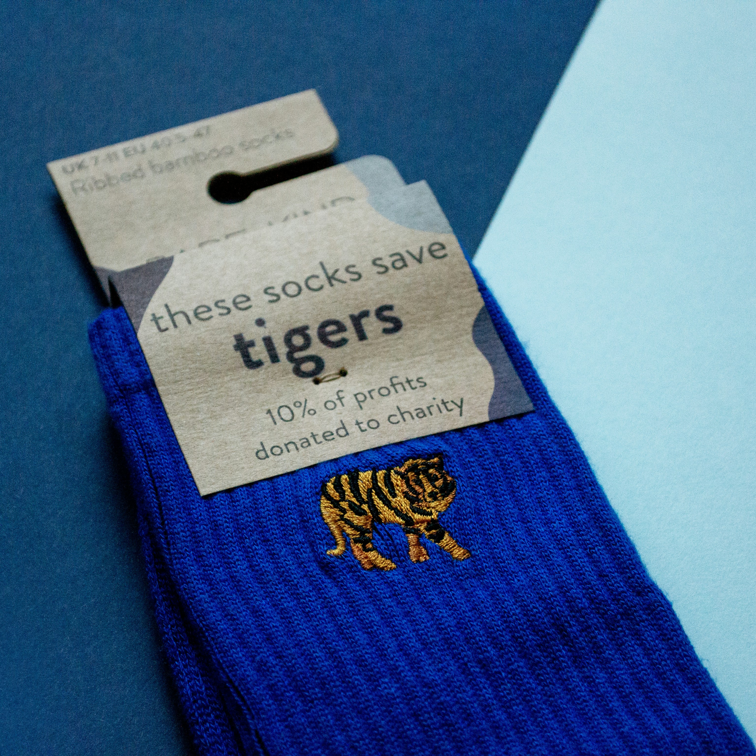 Electric Blue Sock Tag Sparks Tiger Conservation Message