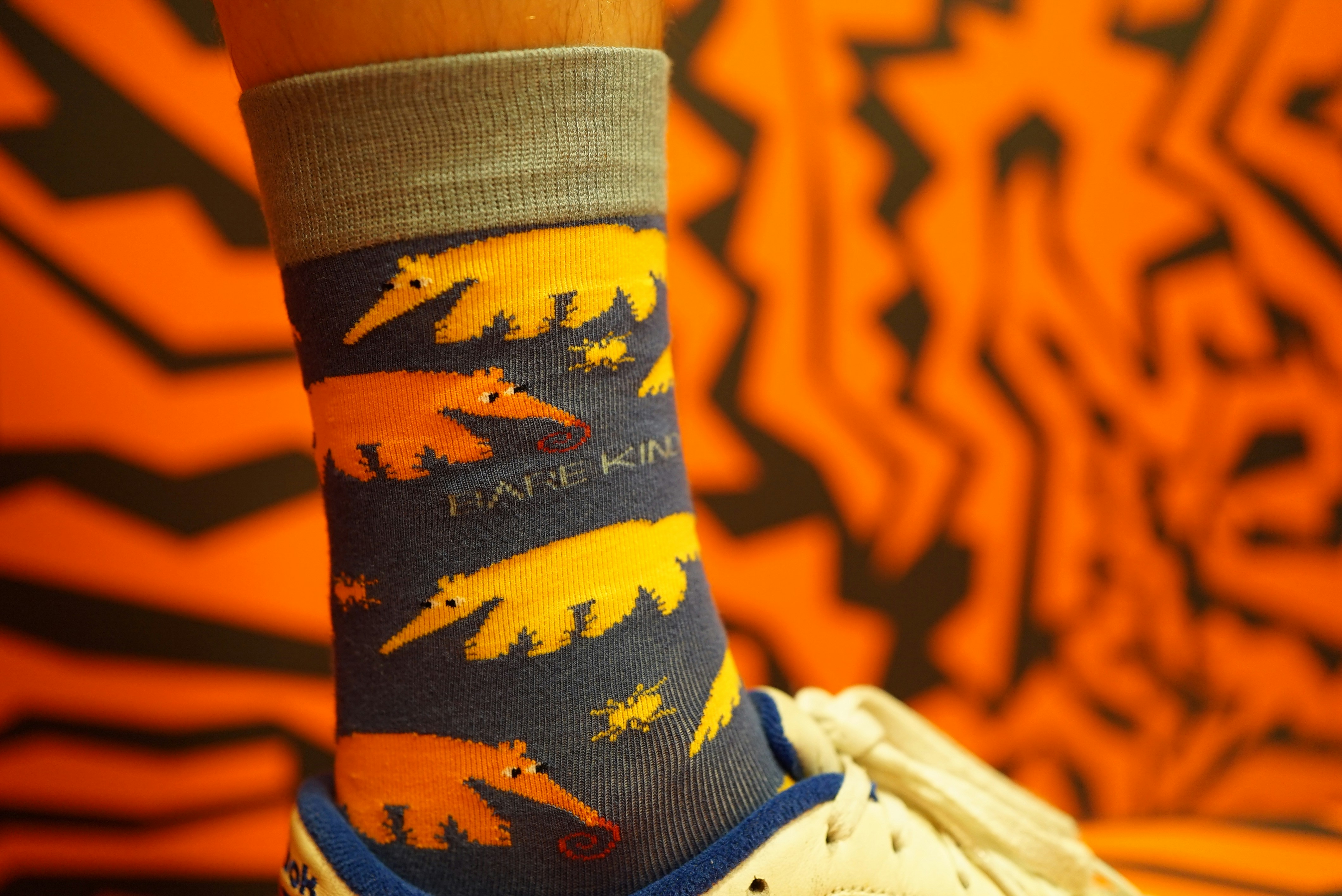 Orange stripes on the runway: a sock-clad step into bold patterns
