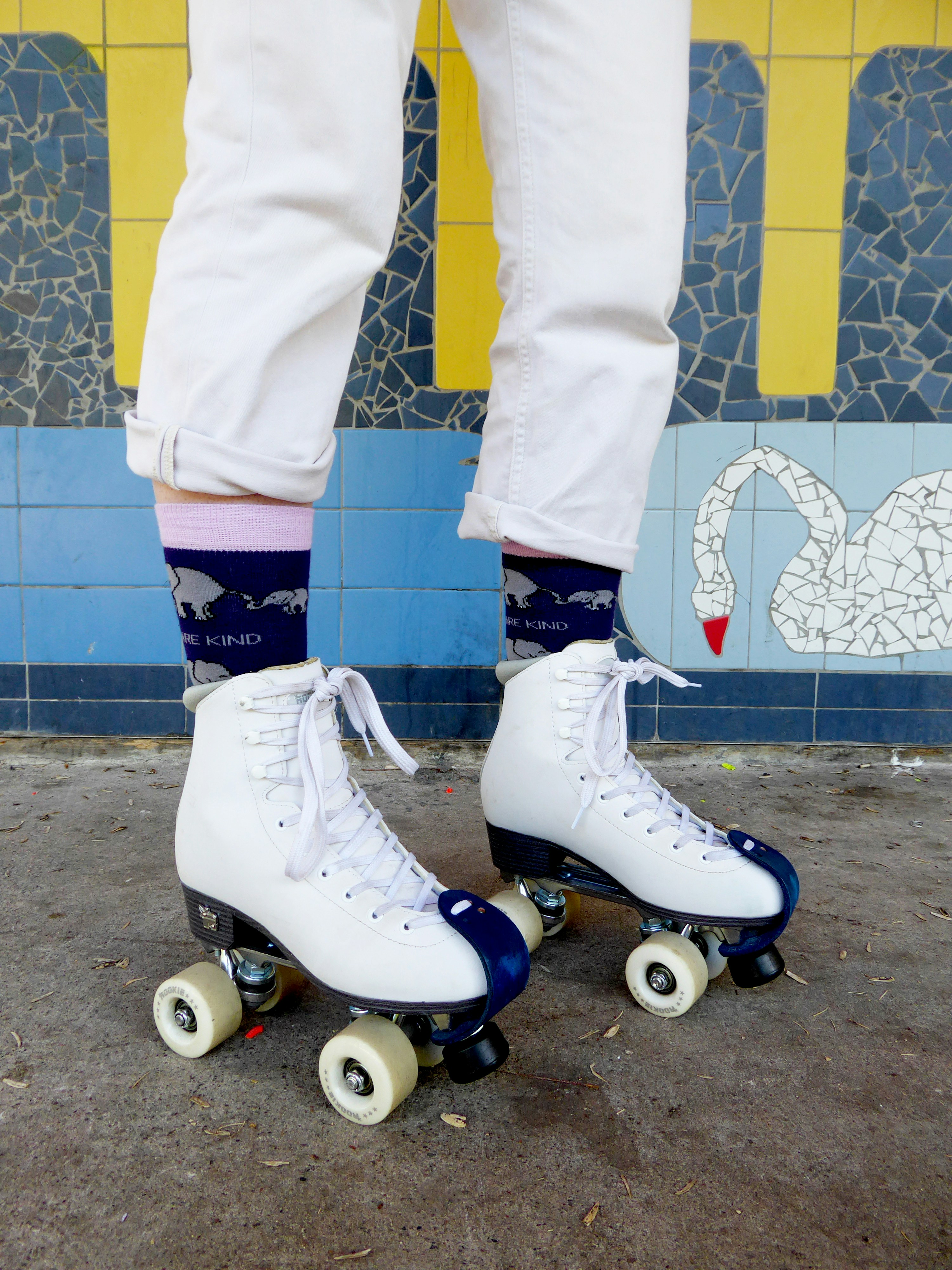 A person riding roller skates on a sidewalk photo – Free Wheel Image on ...