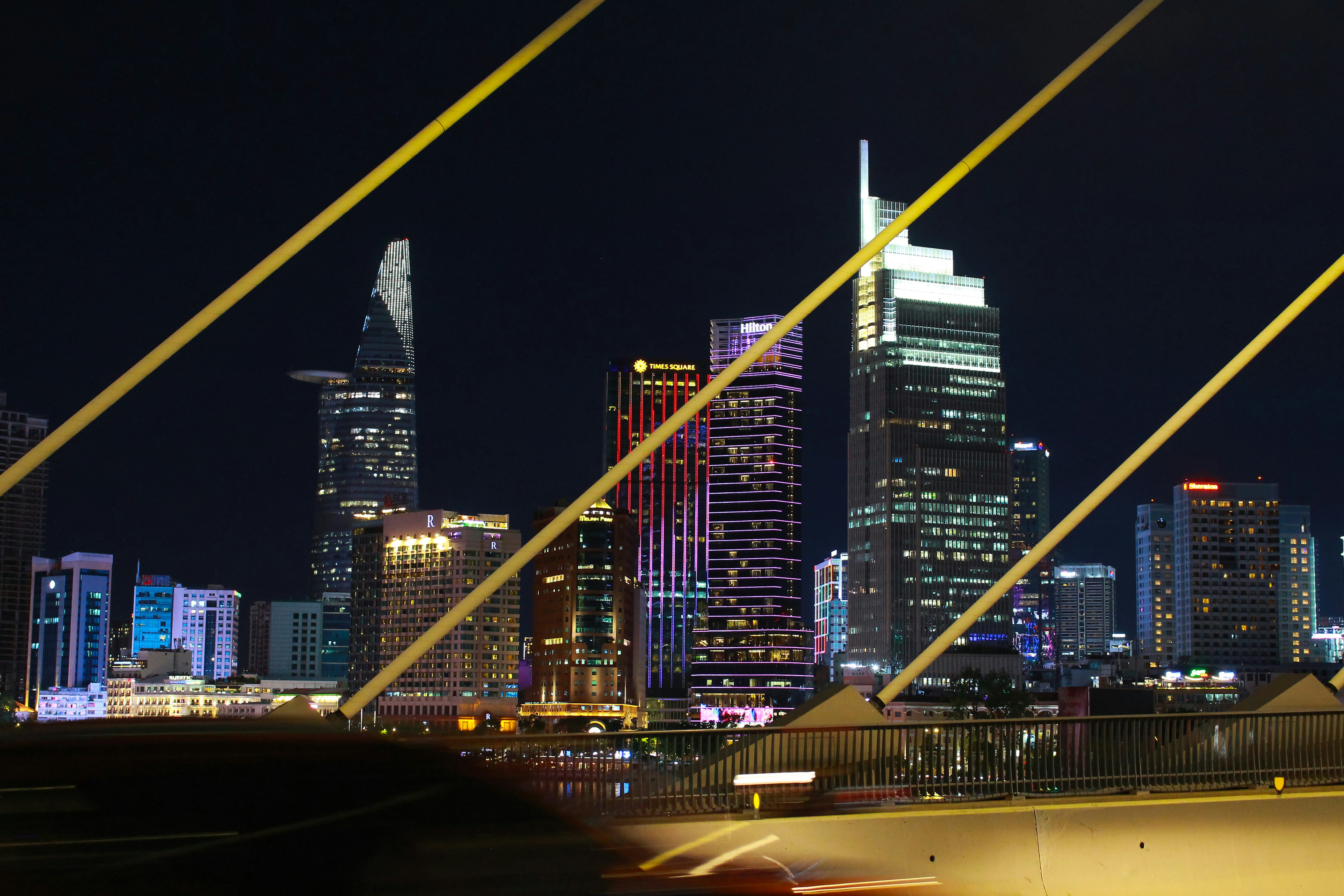 Neon Skyline Over Passersby in Motion