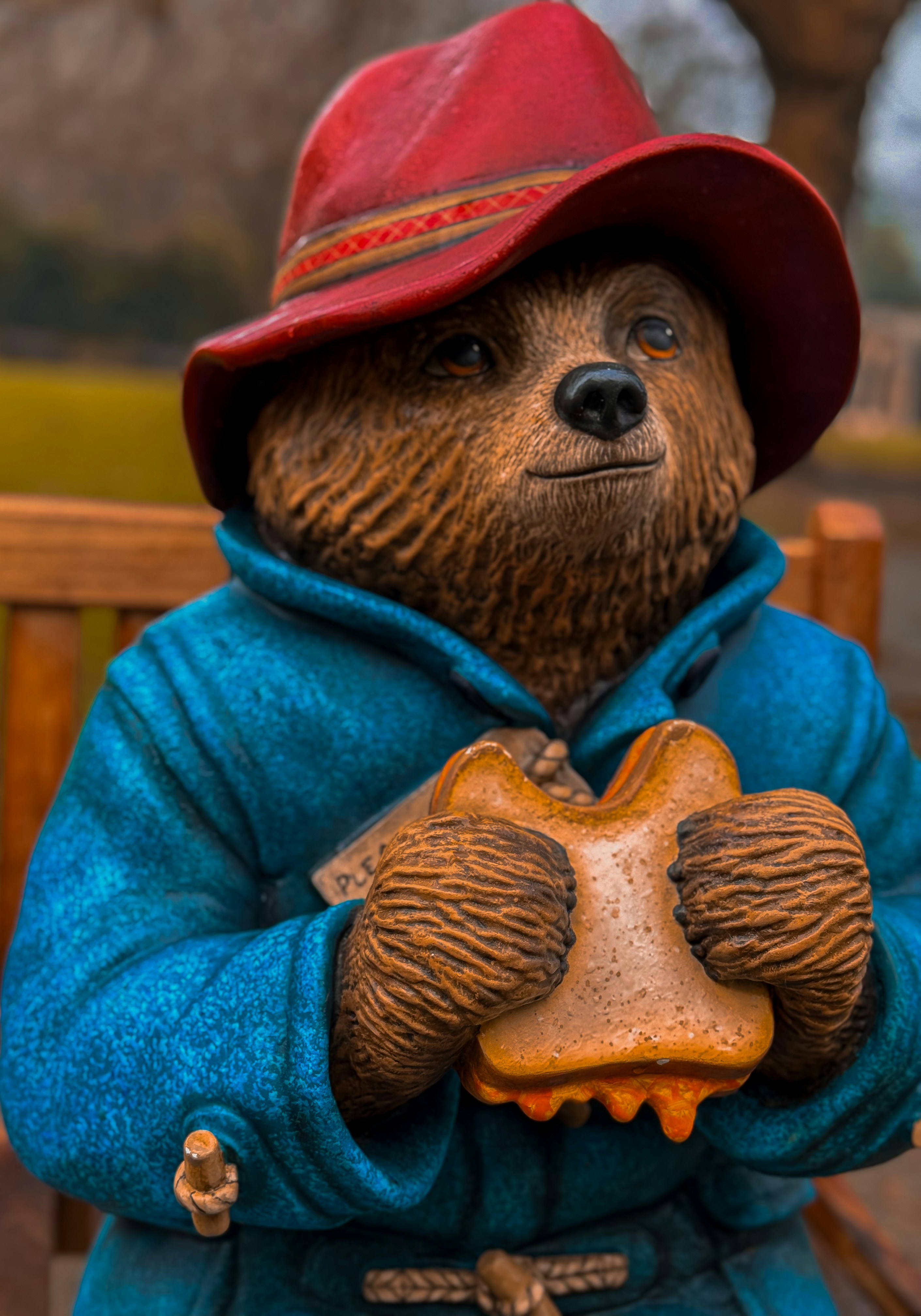Toast Time with a Blue-Coated Bear Under a Red Fedora