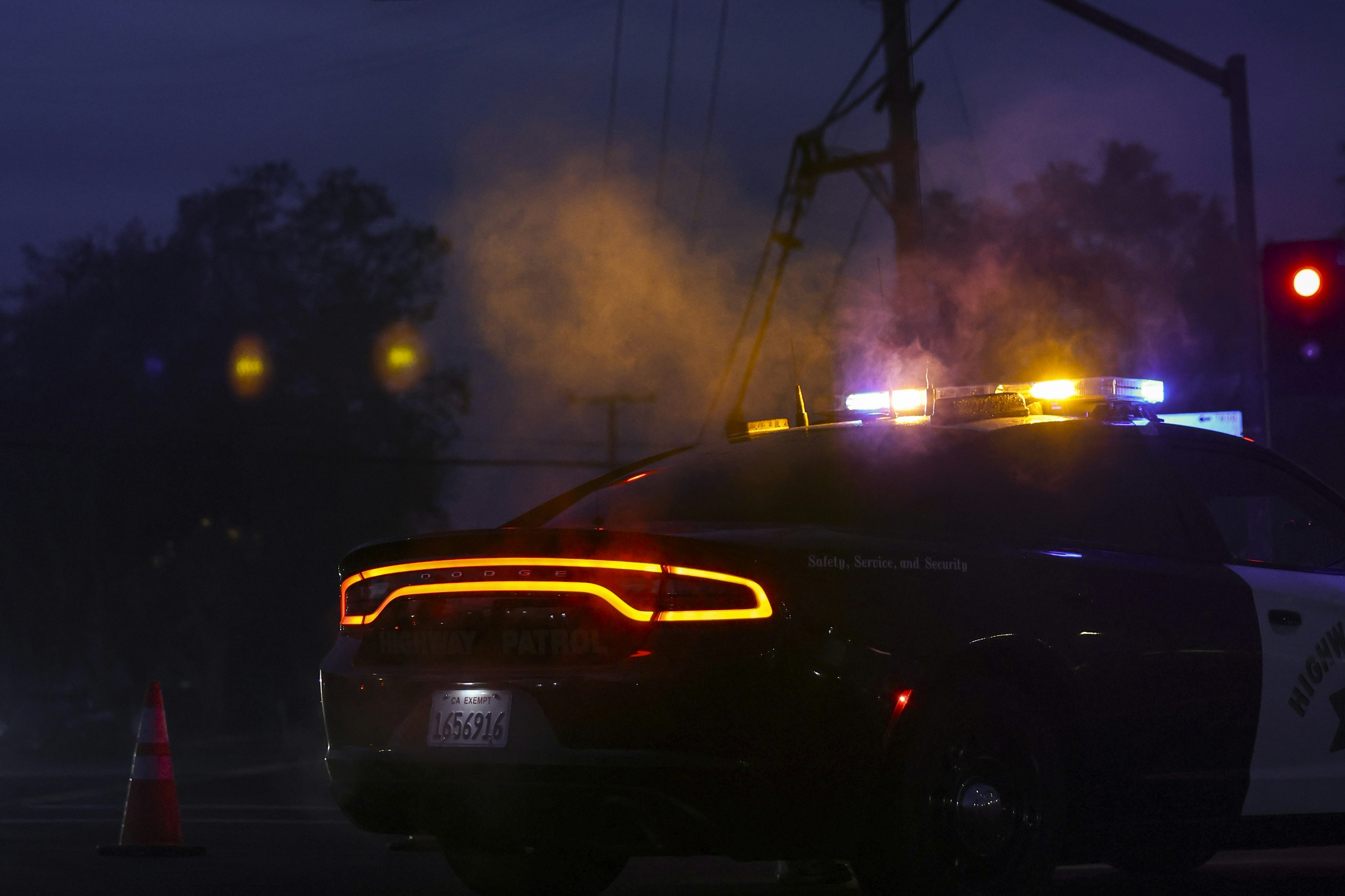 A police car with its lights on at night photo – Free Car Image on Unsplash