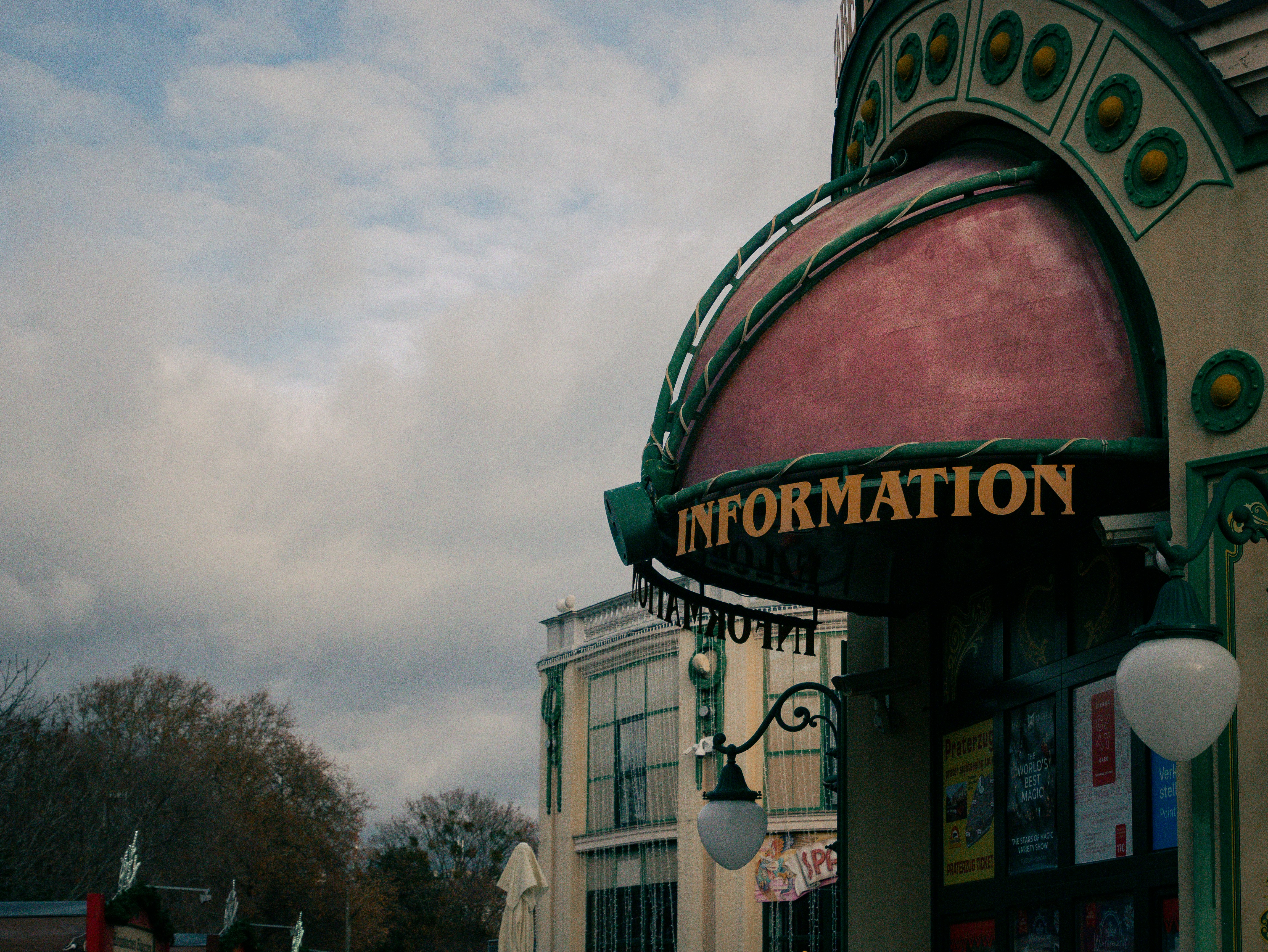 Deco Archway Information Booth on a Quiet Street