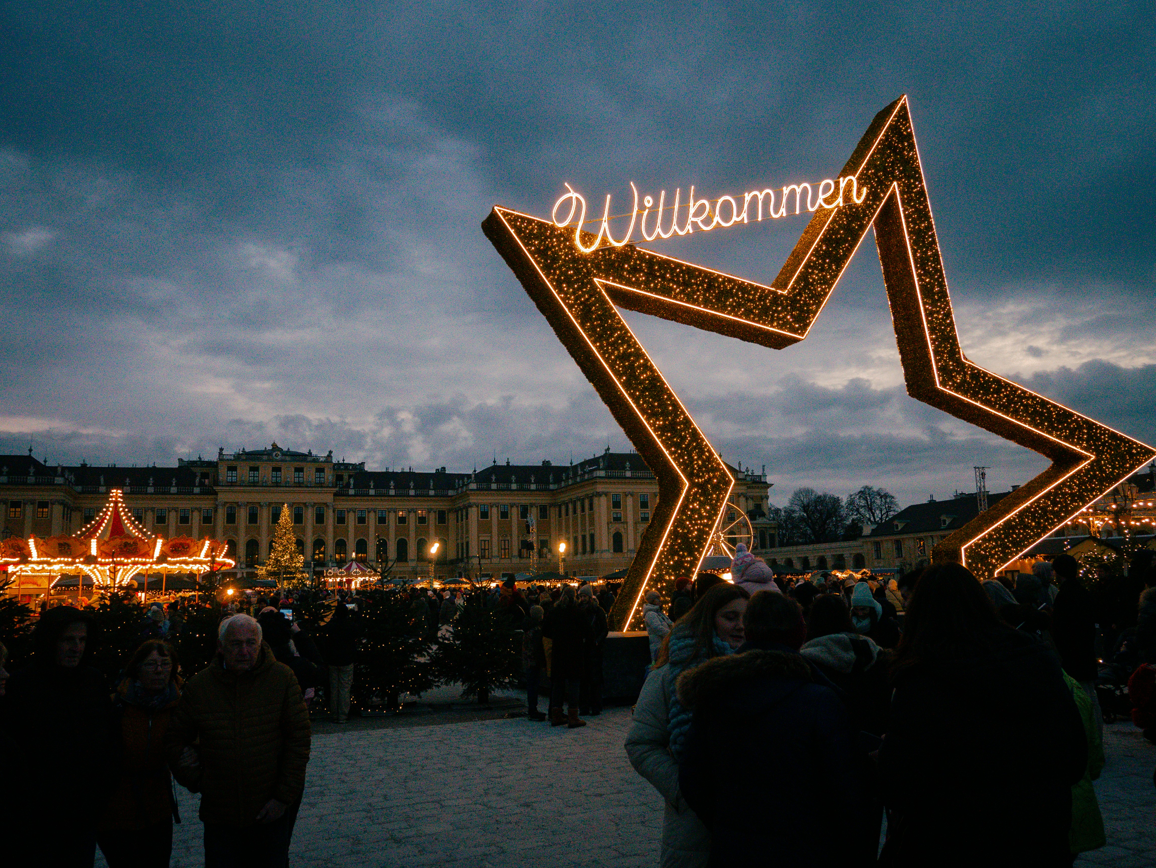 Illuminated Star Arch at a Festive City Square