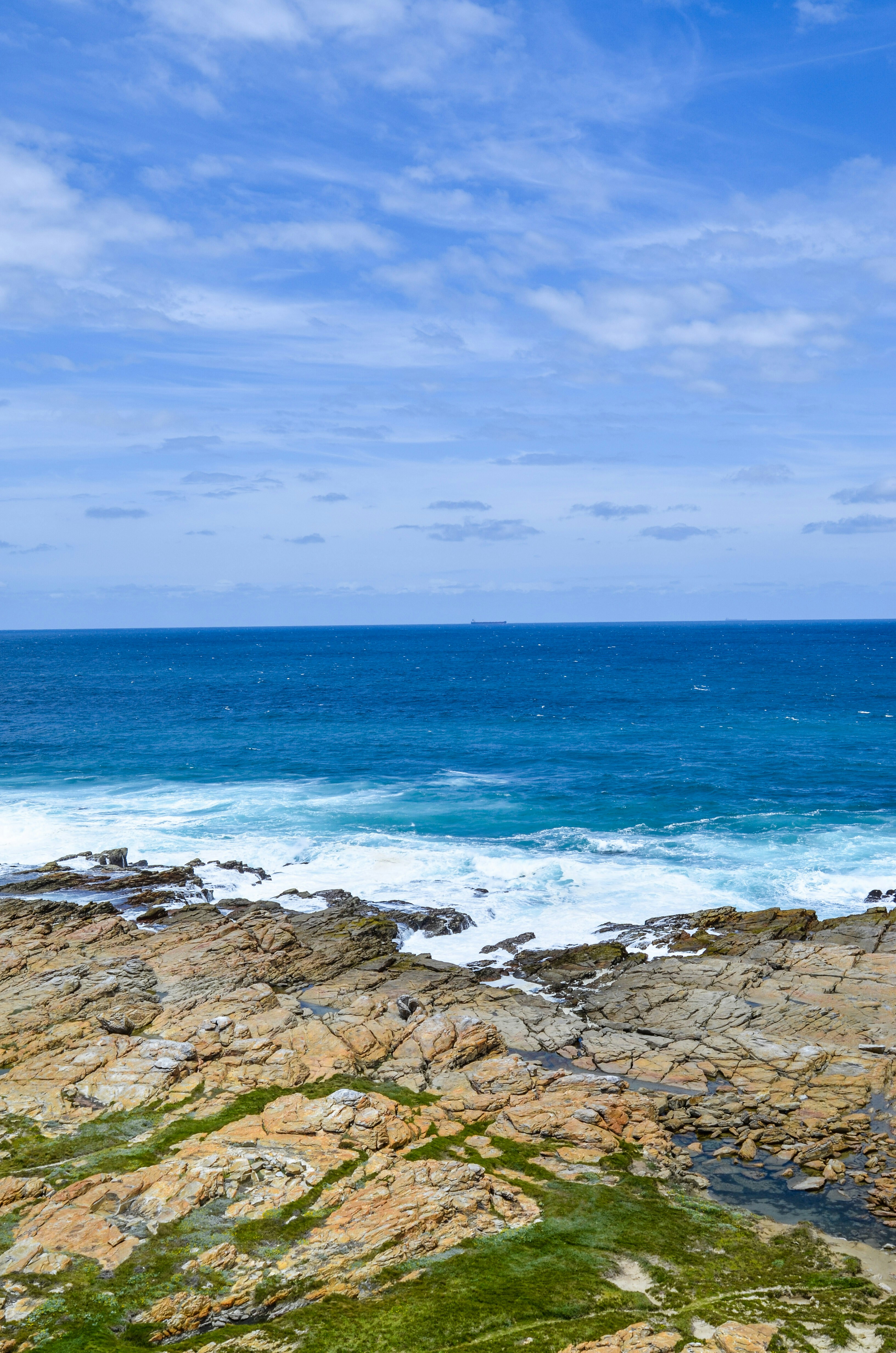 A view of the ocean from a rocky outcropping photo – Free St francis ...