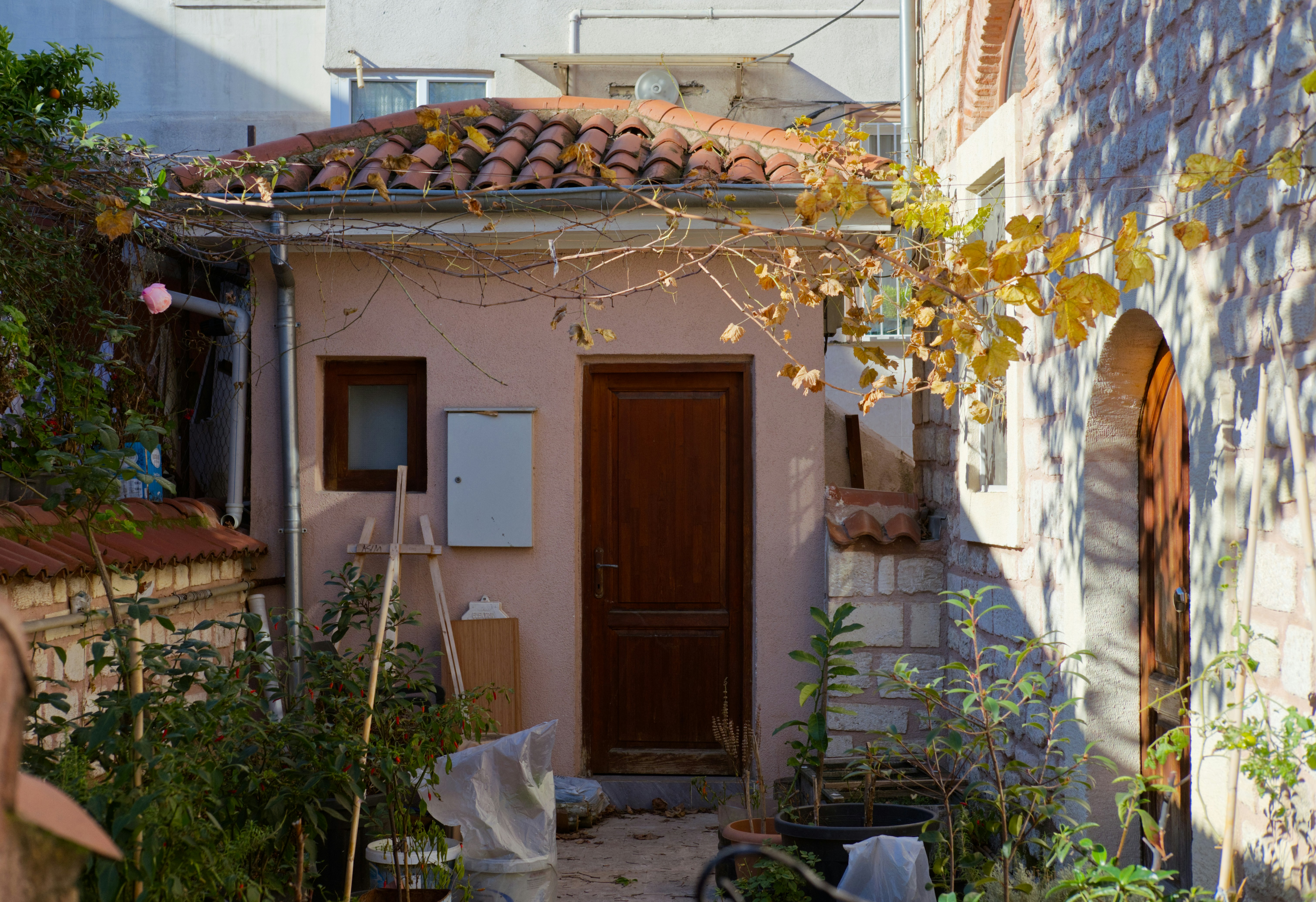 A house with a bicycle parked in front of it