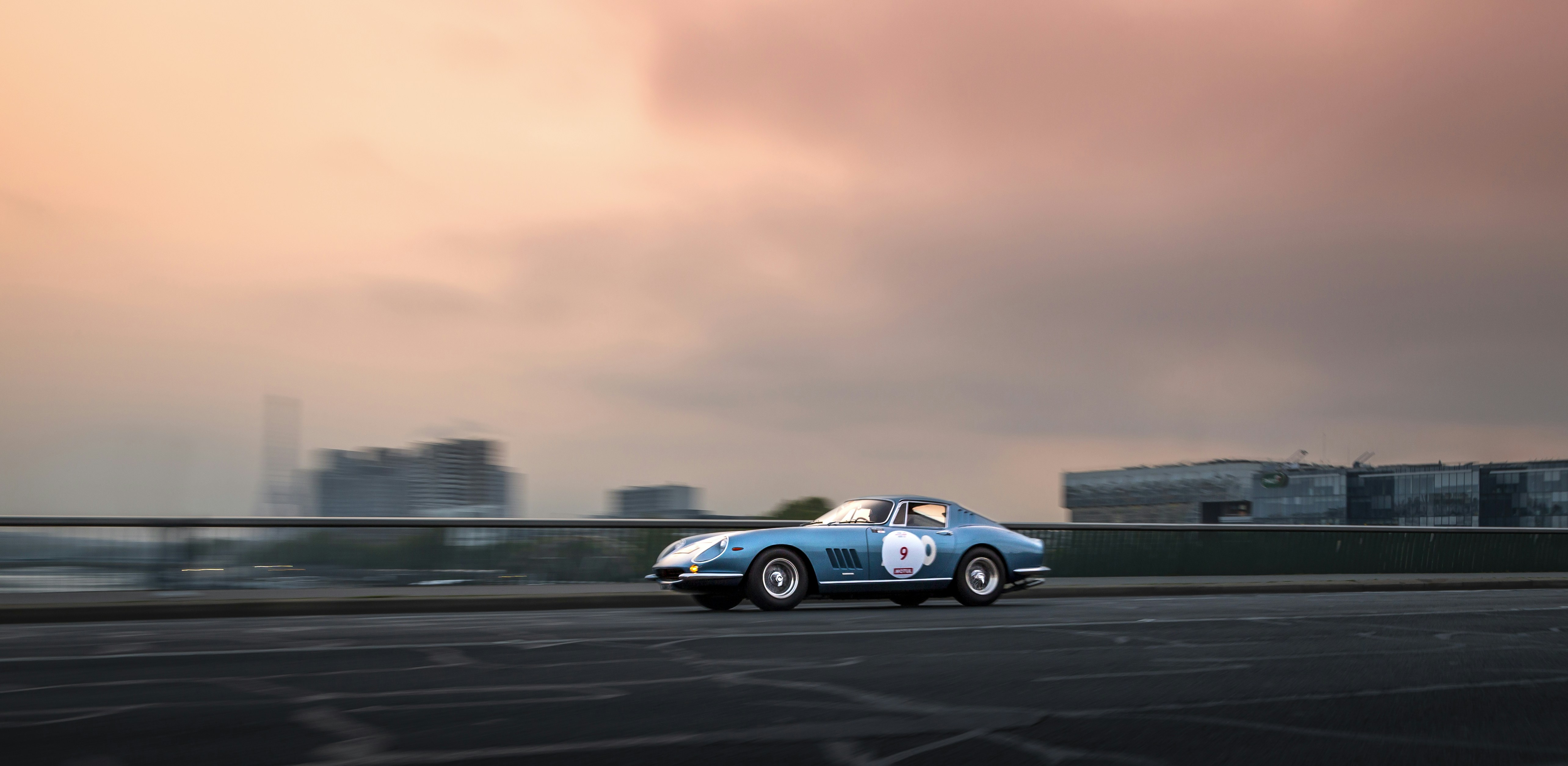 Azure Classic Racer on a Dusk-Soft City Highway