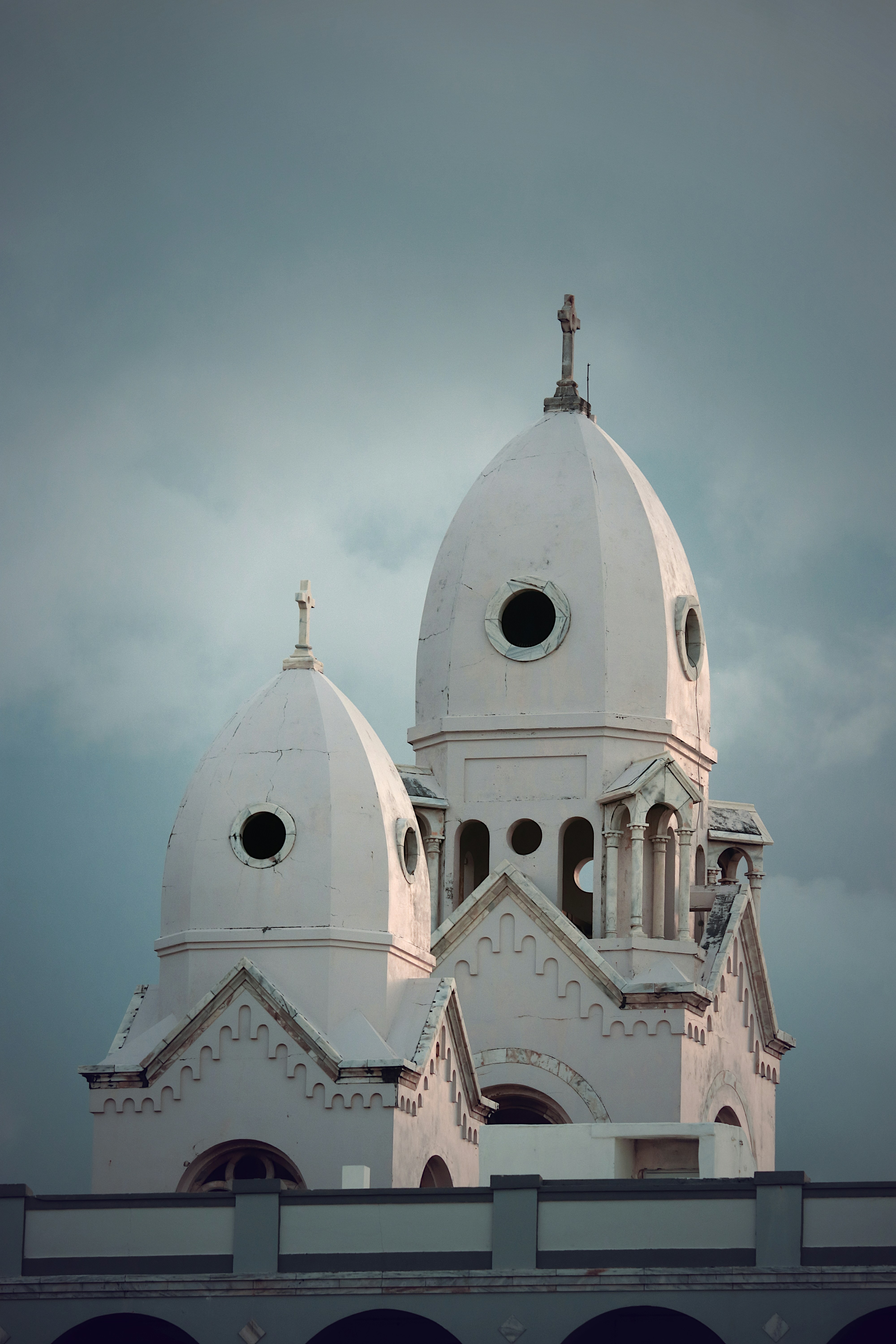 A large white building with a cross on top of it photo – Free Building ...