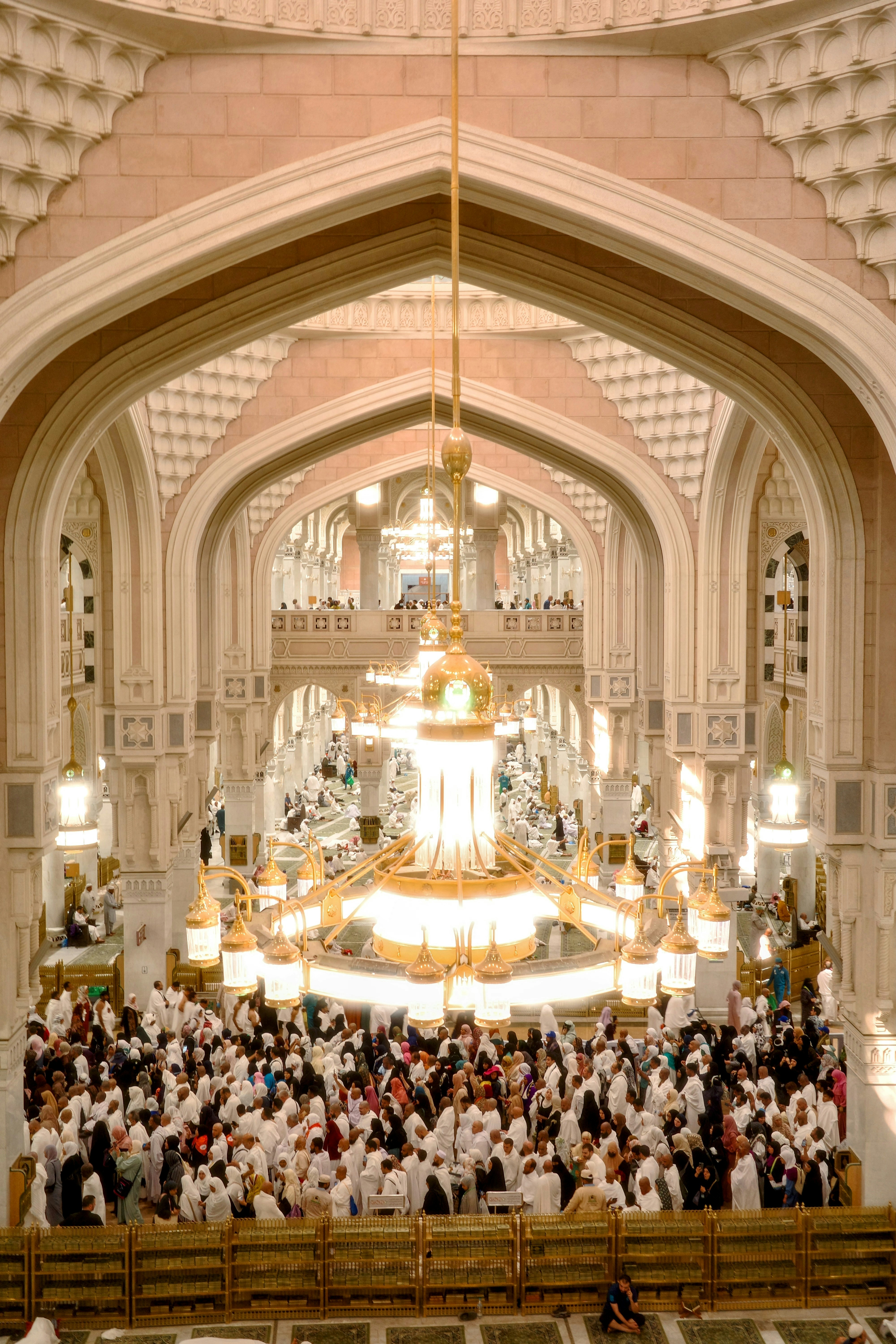 Chandelier Convergence Beneath Marble Arches