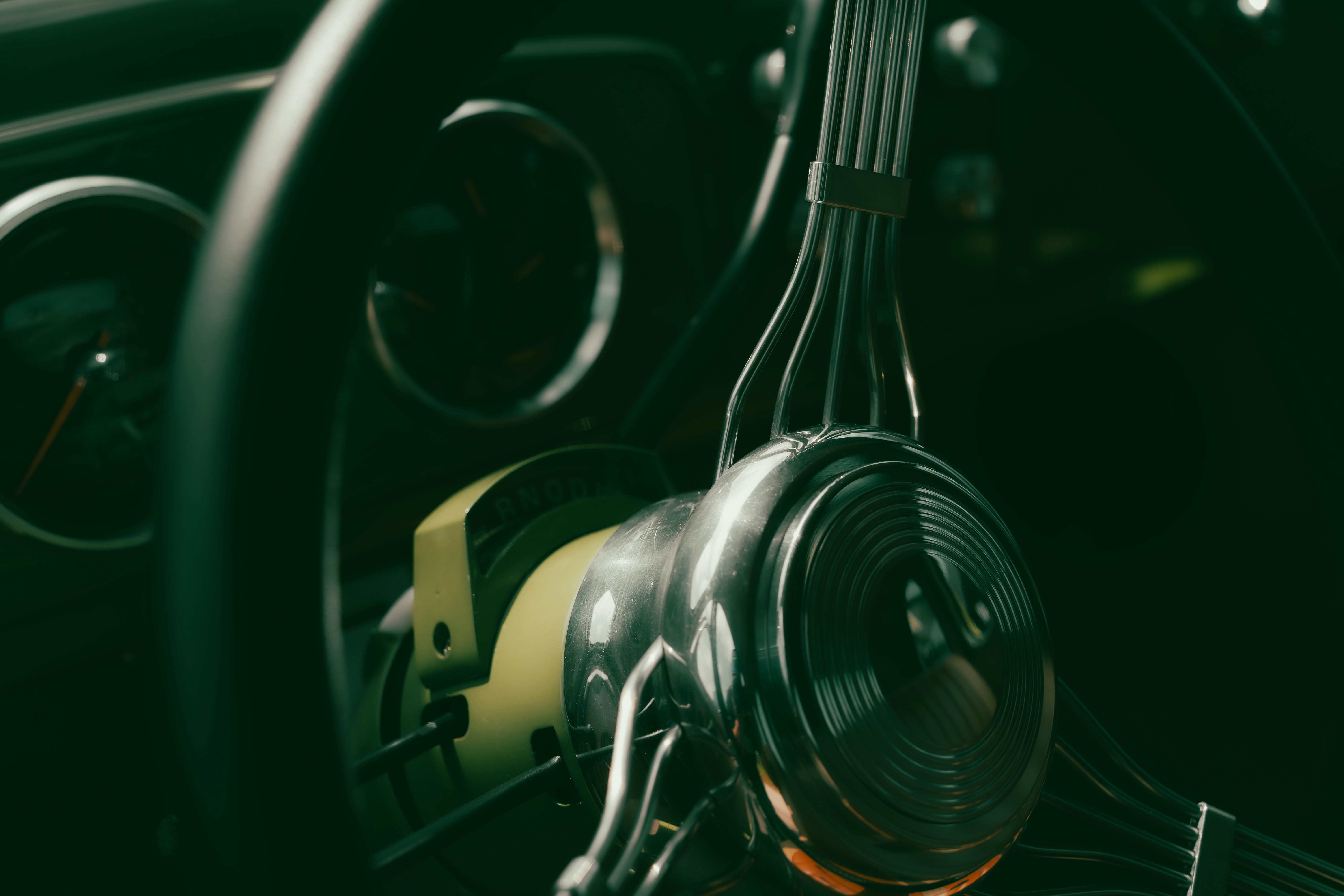 Headphones in the Driver’s Seat: A Steady Close on the Car’s Cockpit