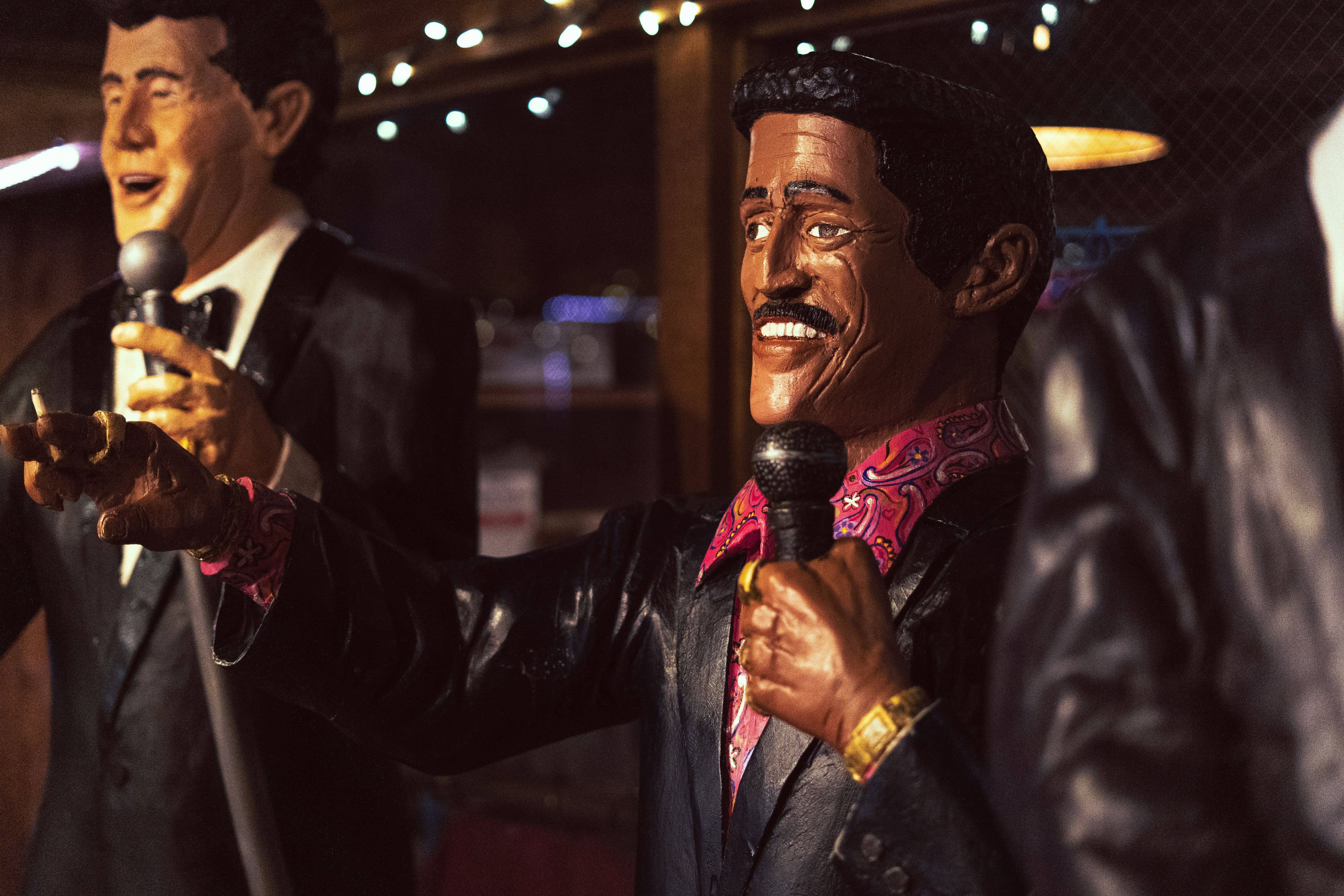 Elvis Echoes at Midnight: Twin Impersonators in a Vintage Bar
