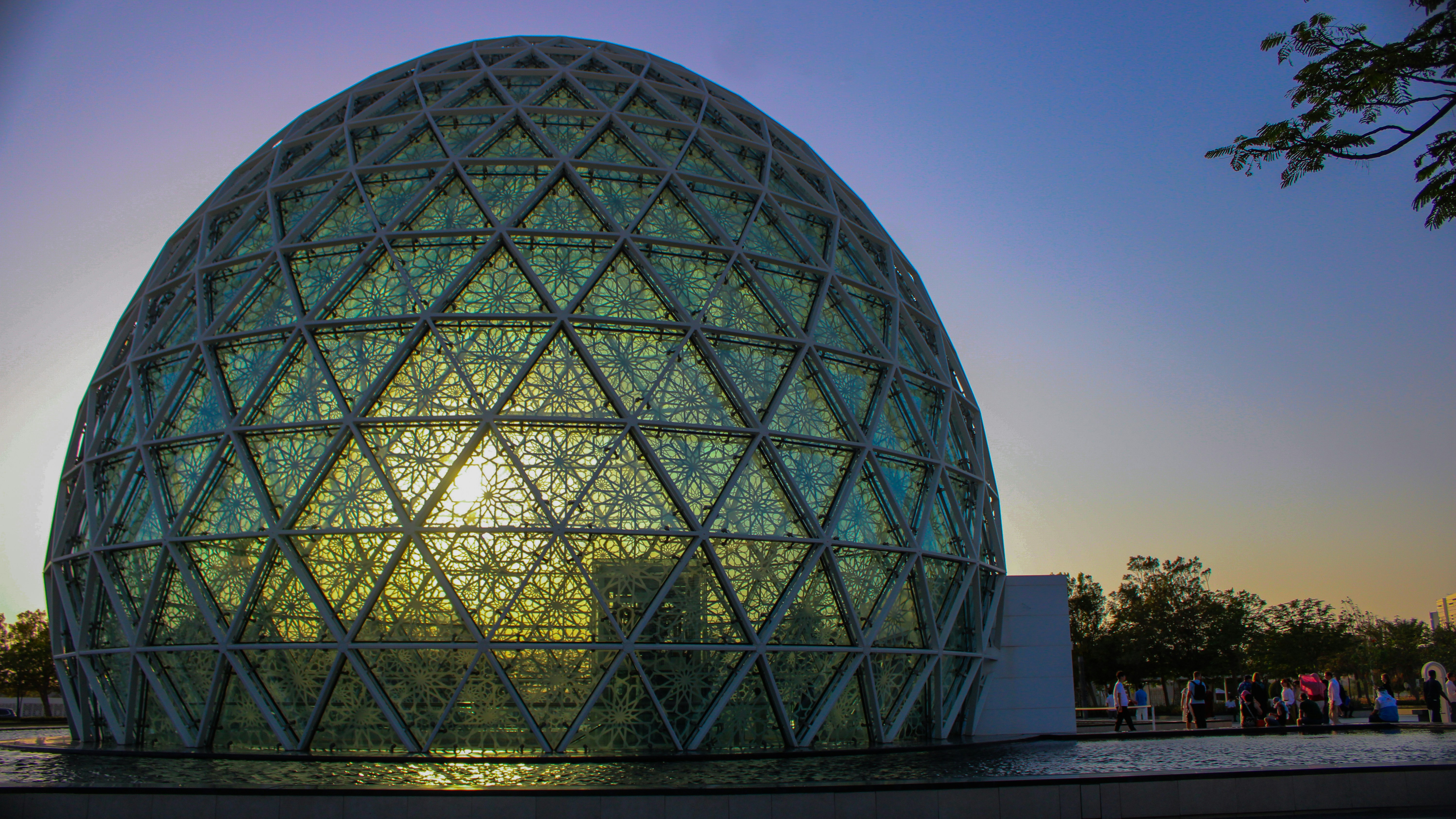 Sunset Geometry over a Geodesic Glass Dome