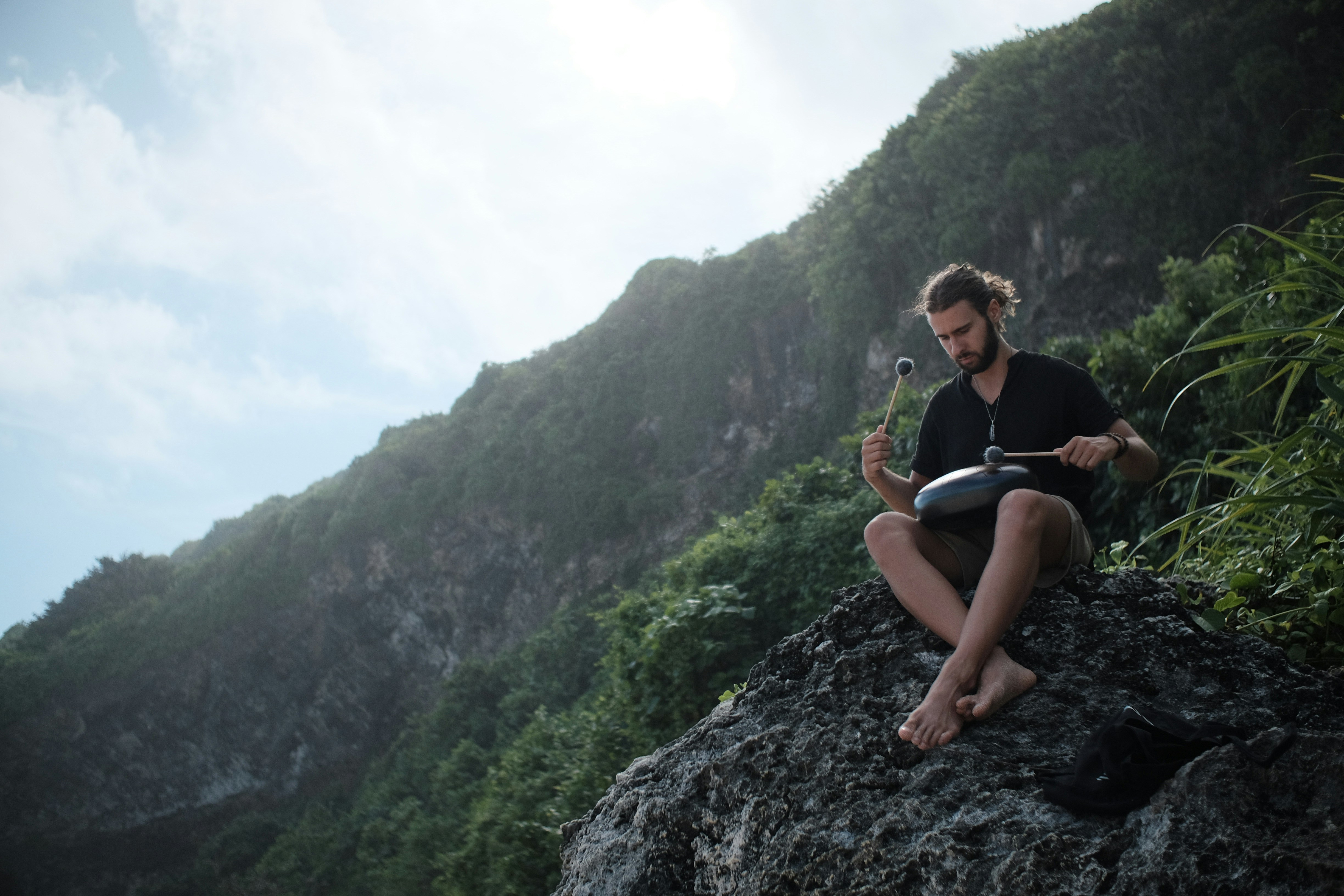 Cliffside Study: Barefoot Focus Above the Valley