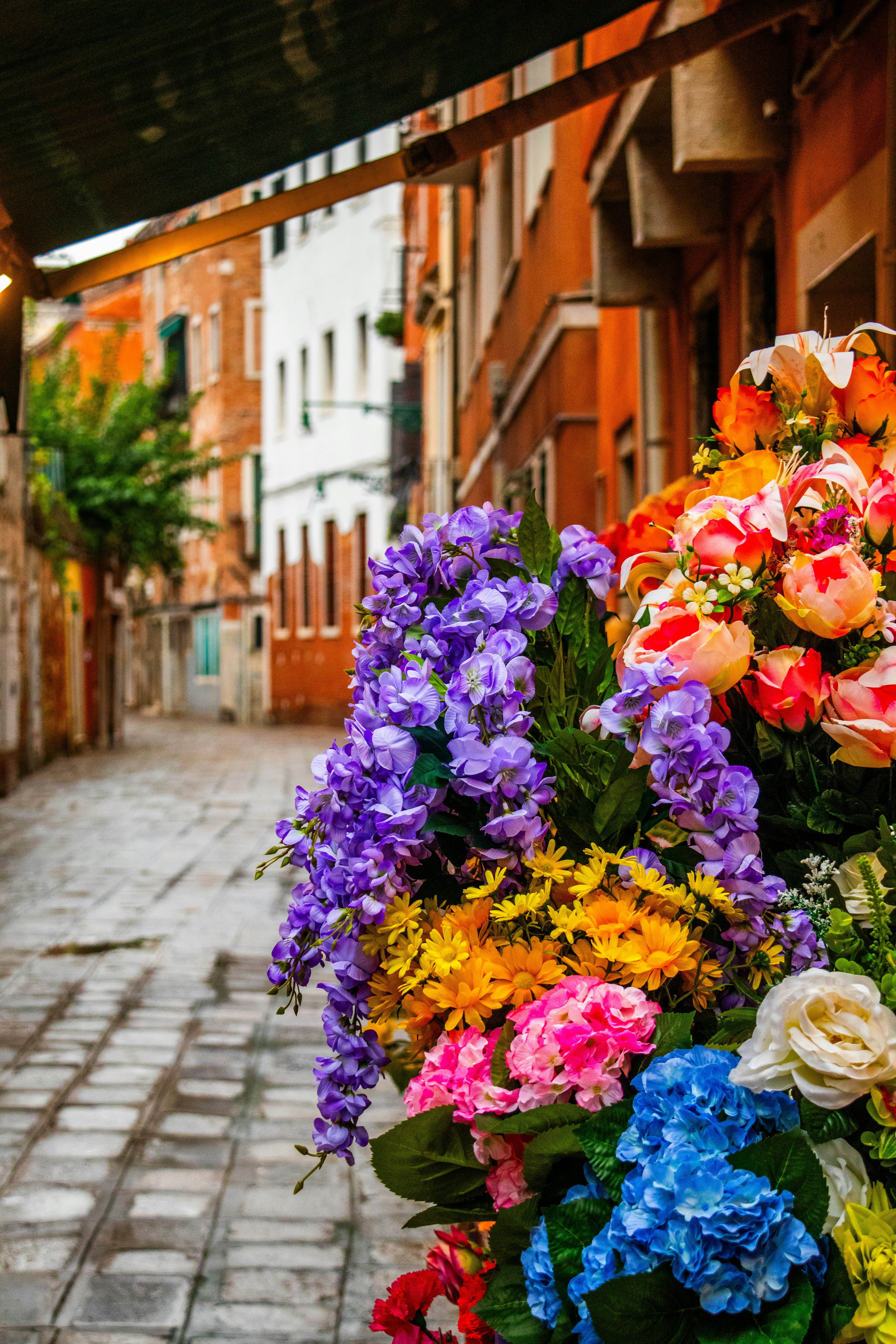 Bouquets on a Cobblestone Lane
