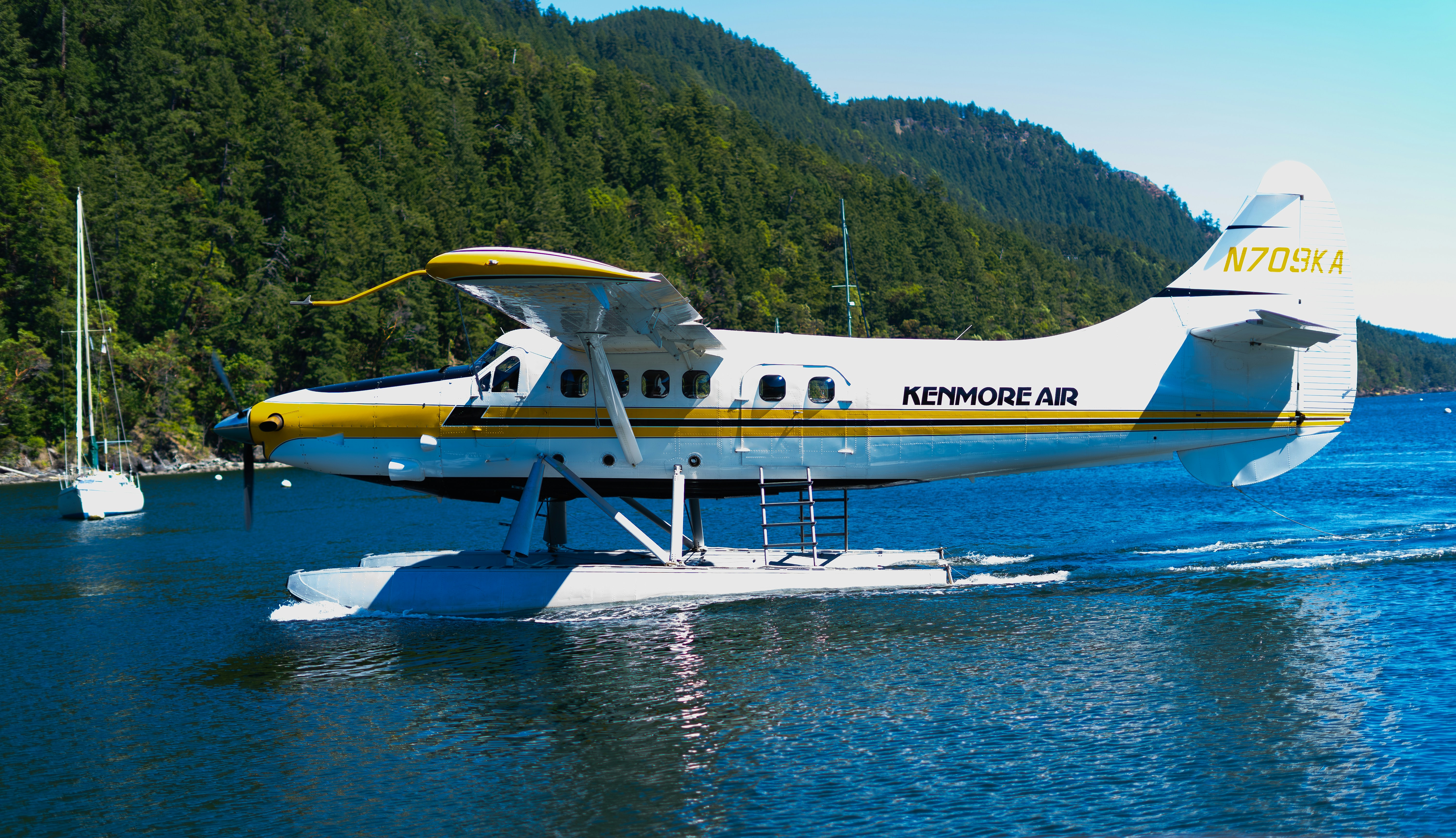 A sea plane is floating on the water photo – Free Aircraft Image on ...