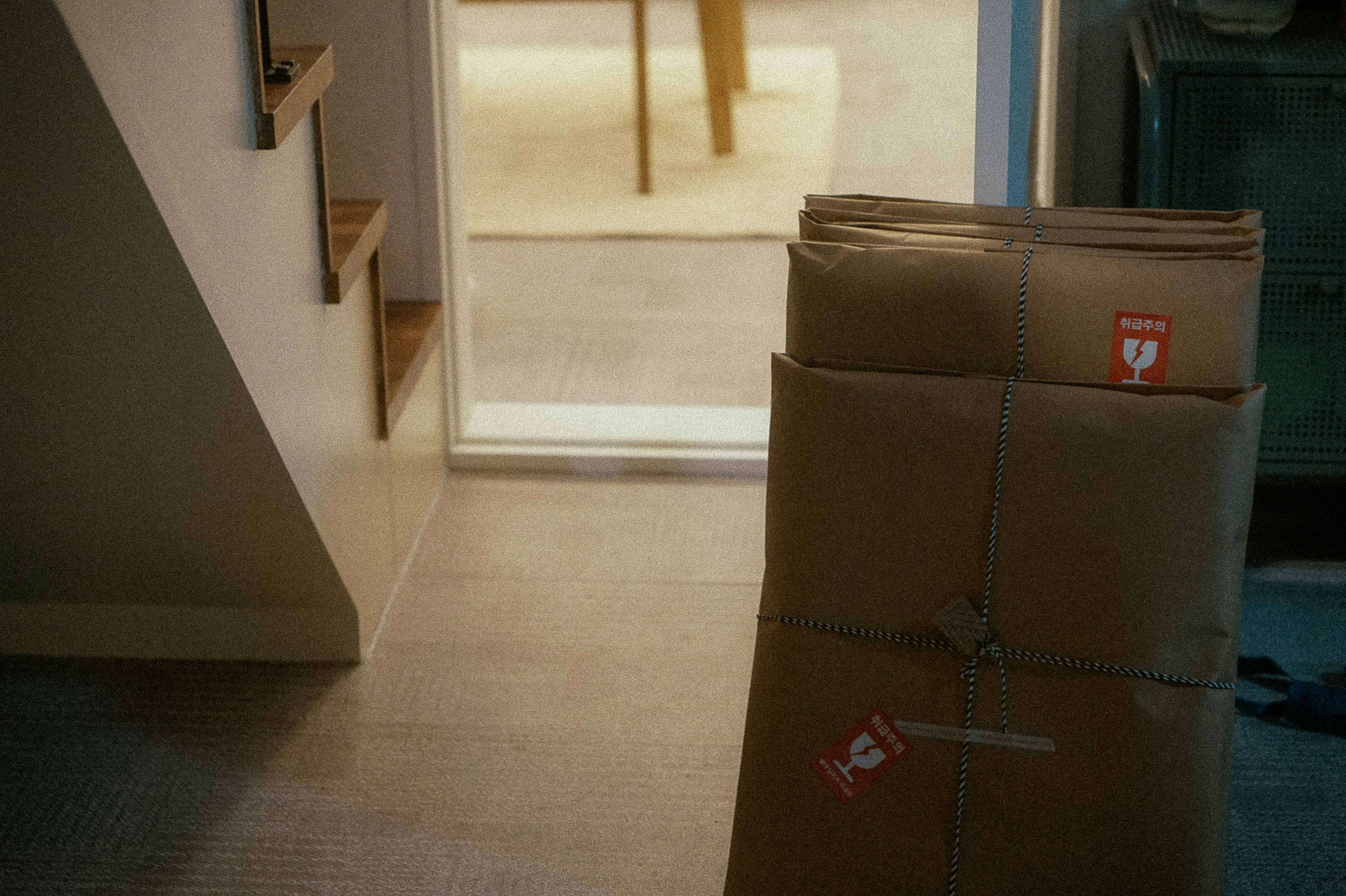 A stack of boxes sitting in front of a door photo – Free Interior ...