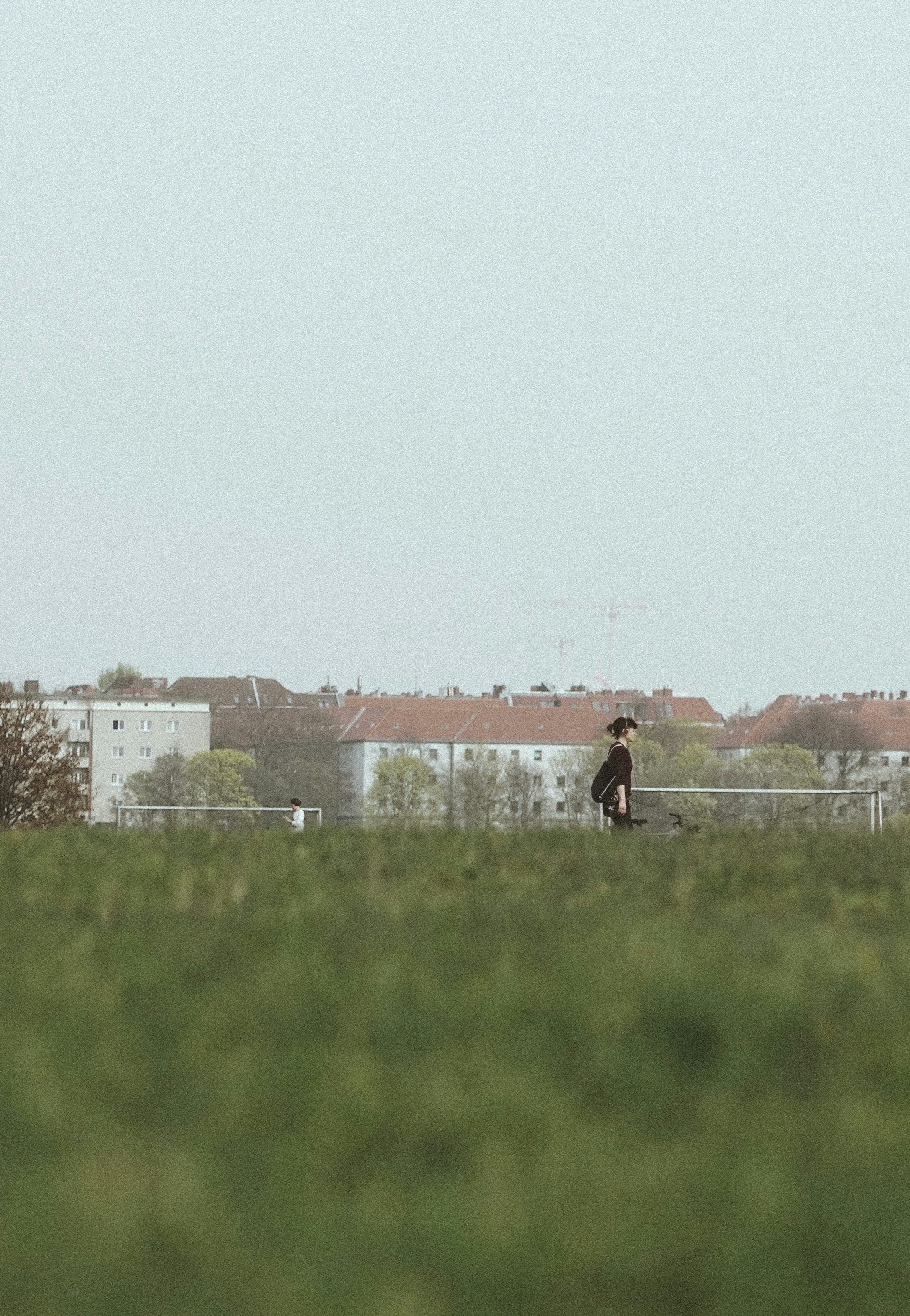 Lone Cyclist on a Quiet Horizon