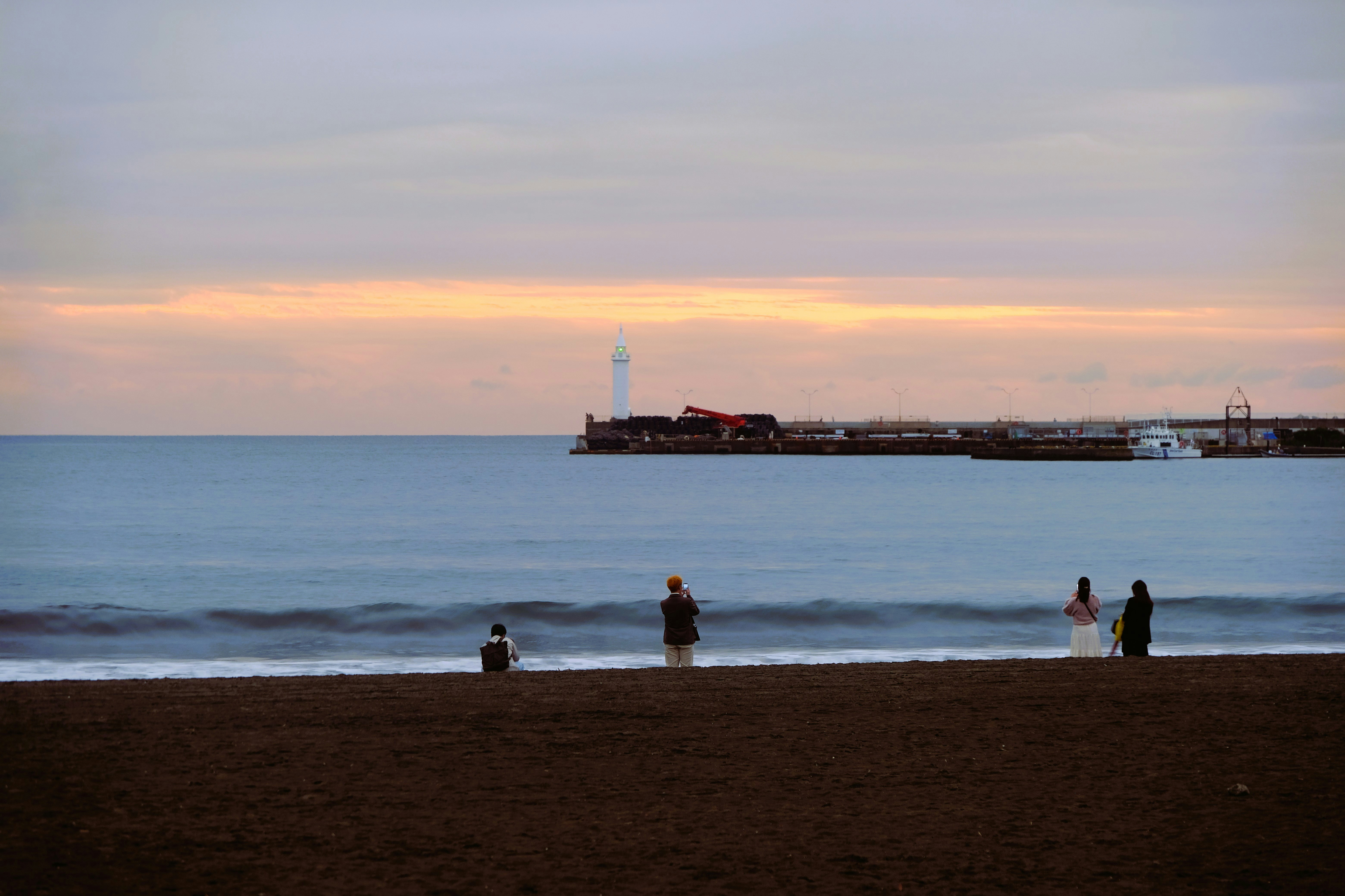 Lighthouse Sentinel at Dusk: A Quiet Shoreline Portrait