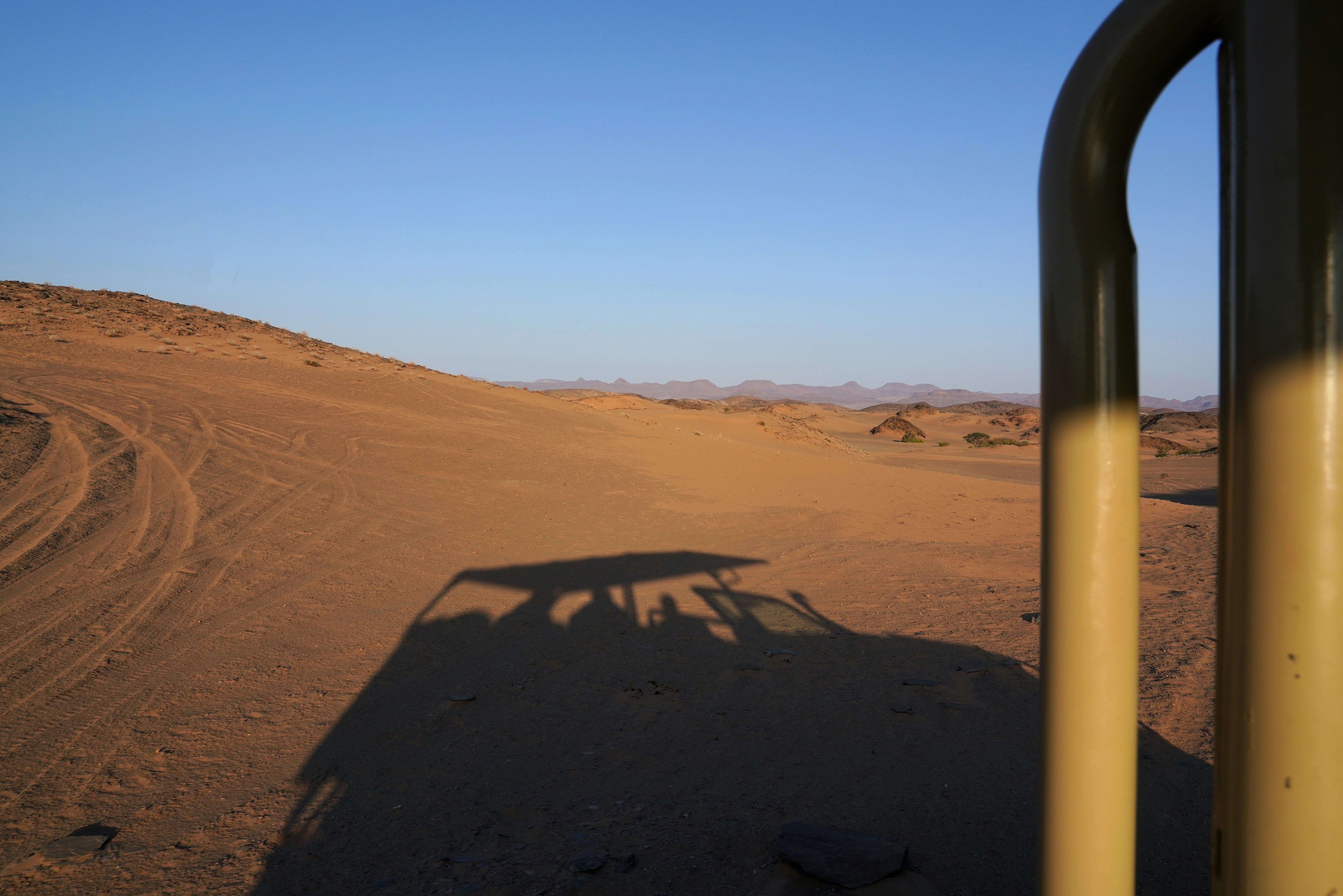 Desert Shadow: The Silent Off-Road Silhouette Across Dune Horizon