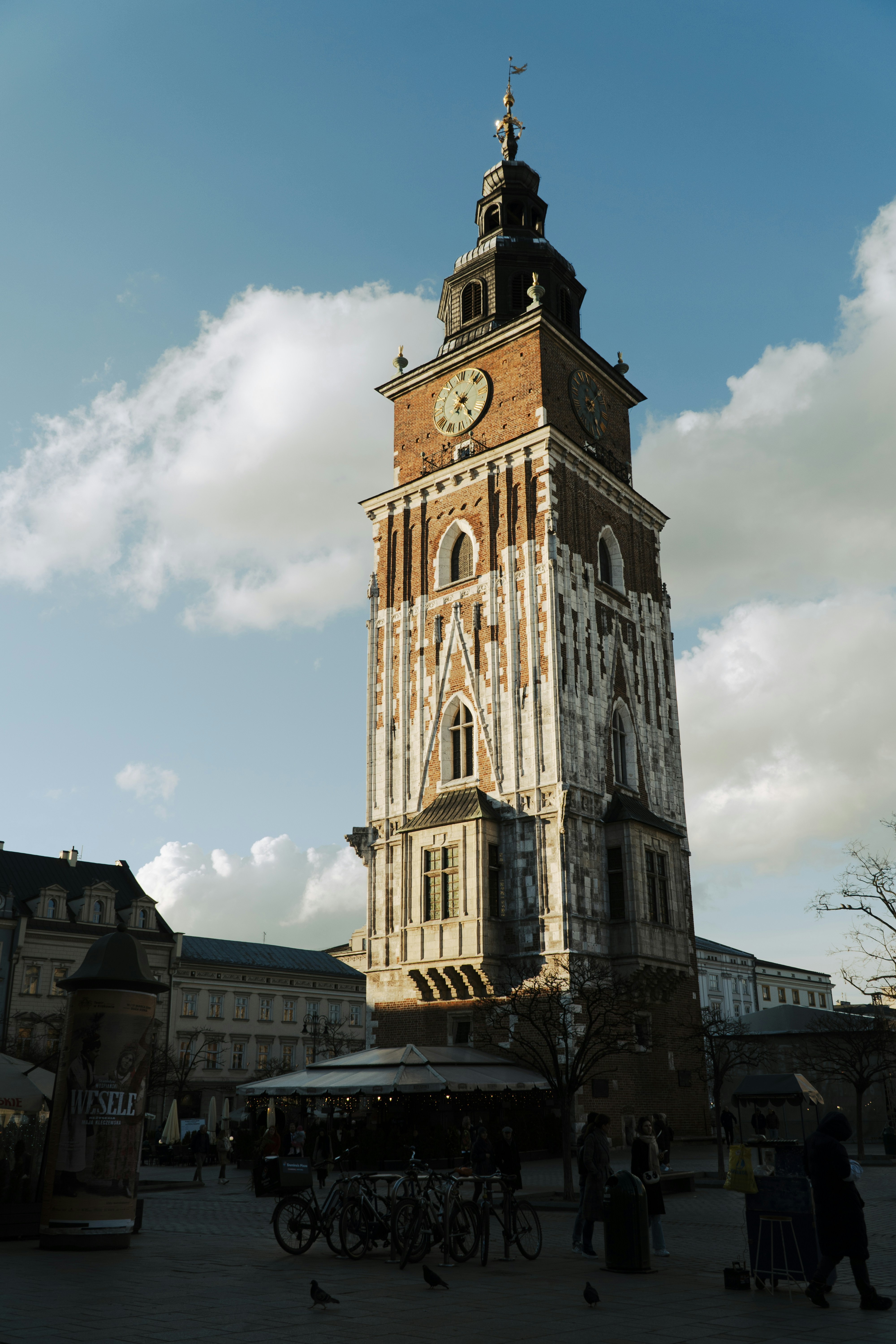 A tall tower with a clock on the top of it photo – Free Building Image ...