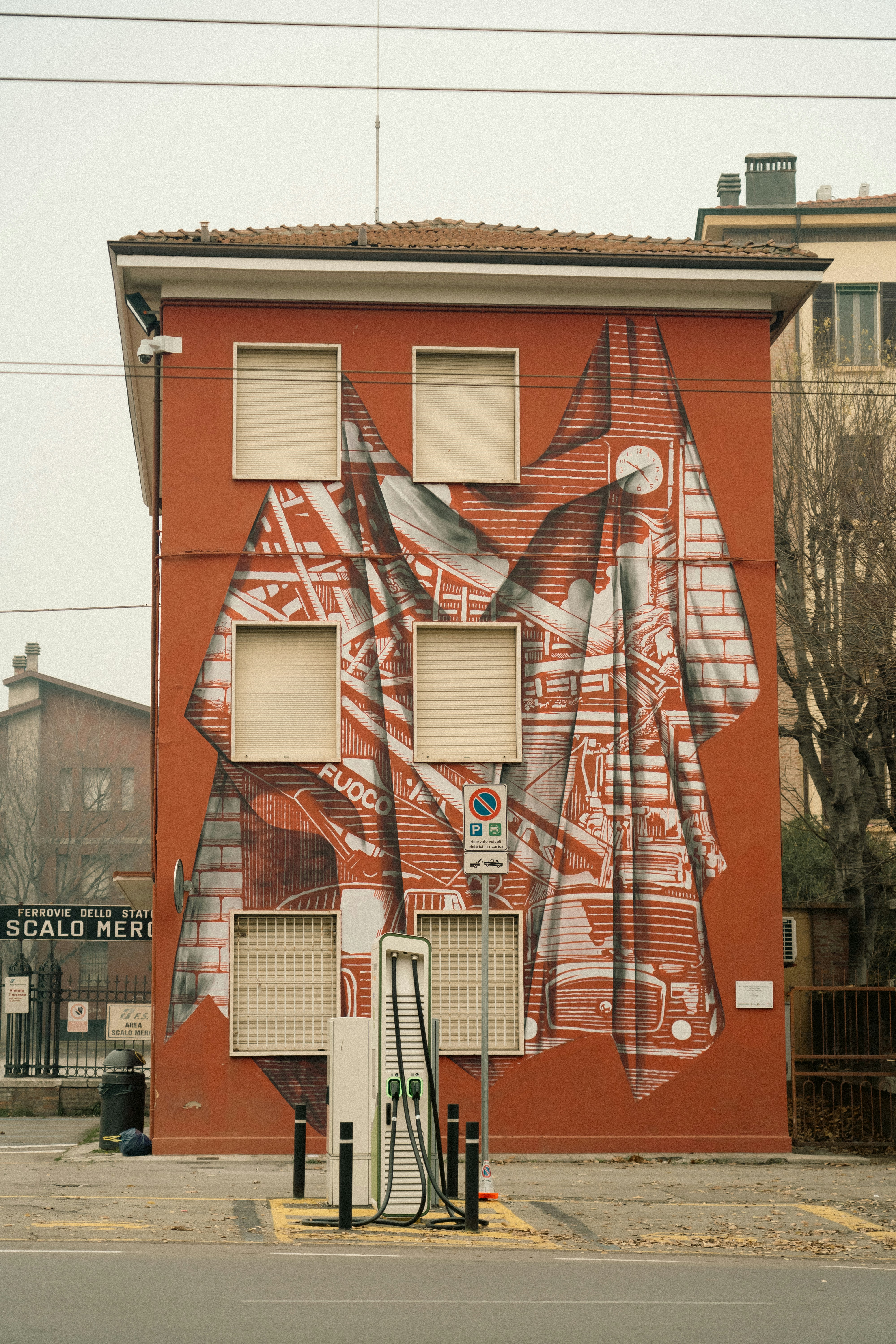 Mural on a Red Facade: Gear of the City