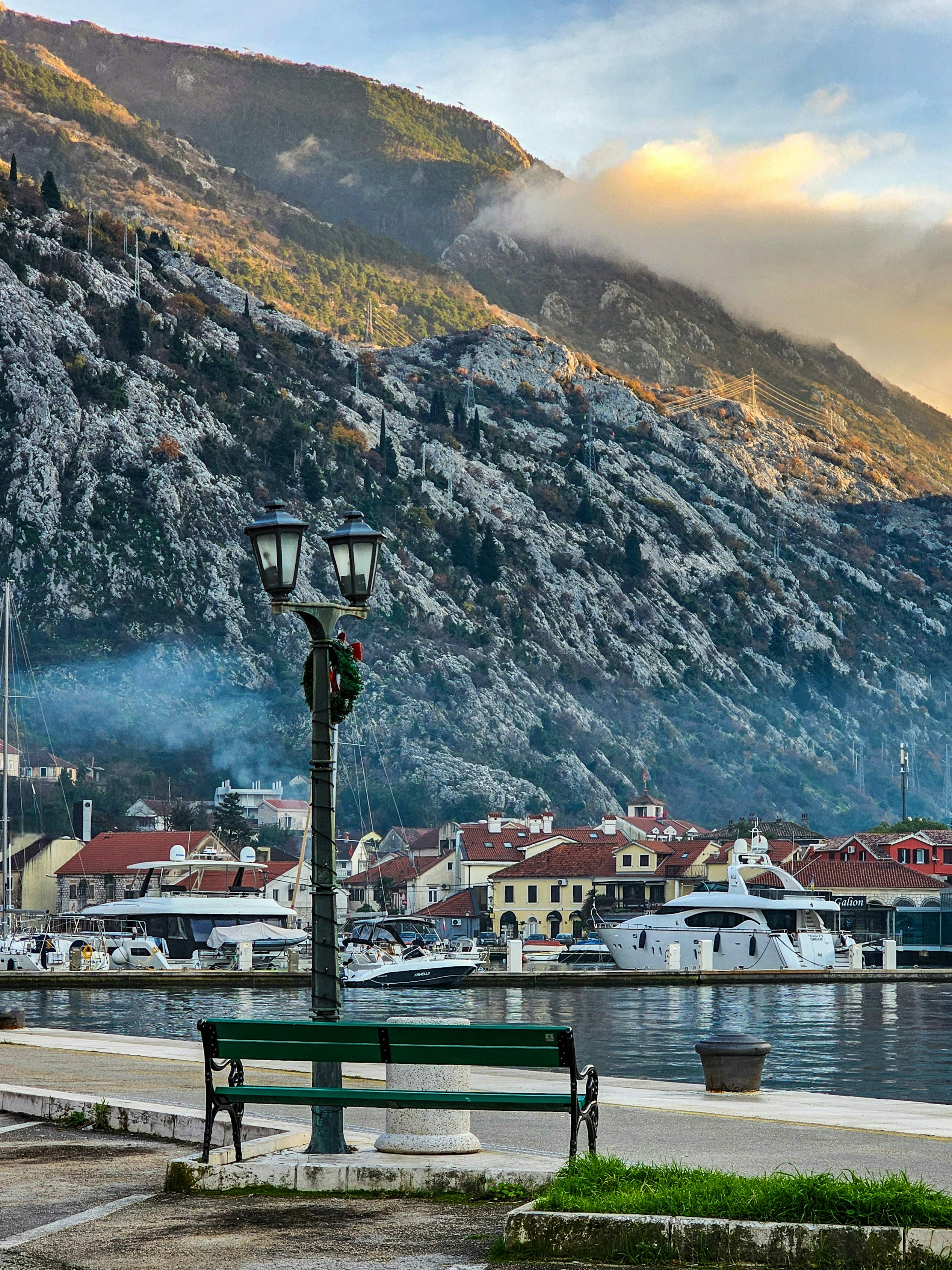 Harbor Lantern Amid Mountain Mist