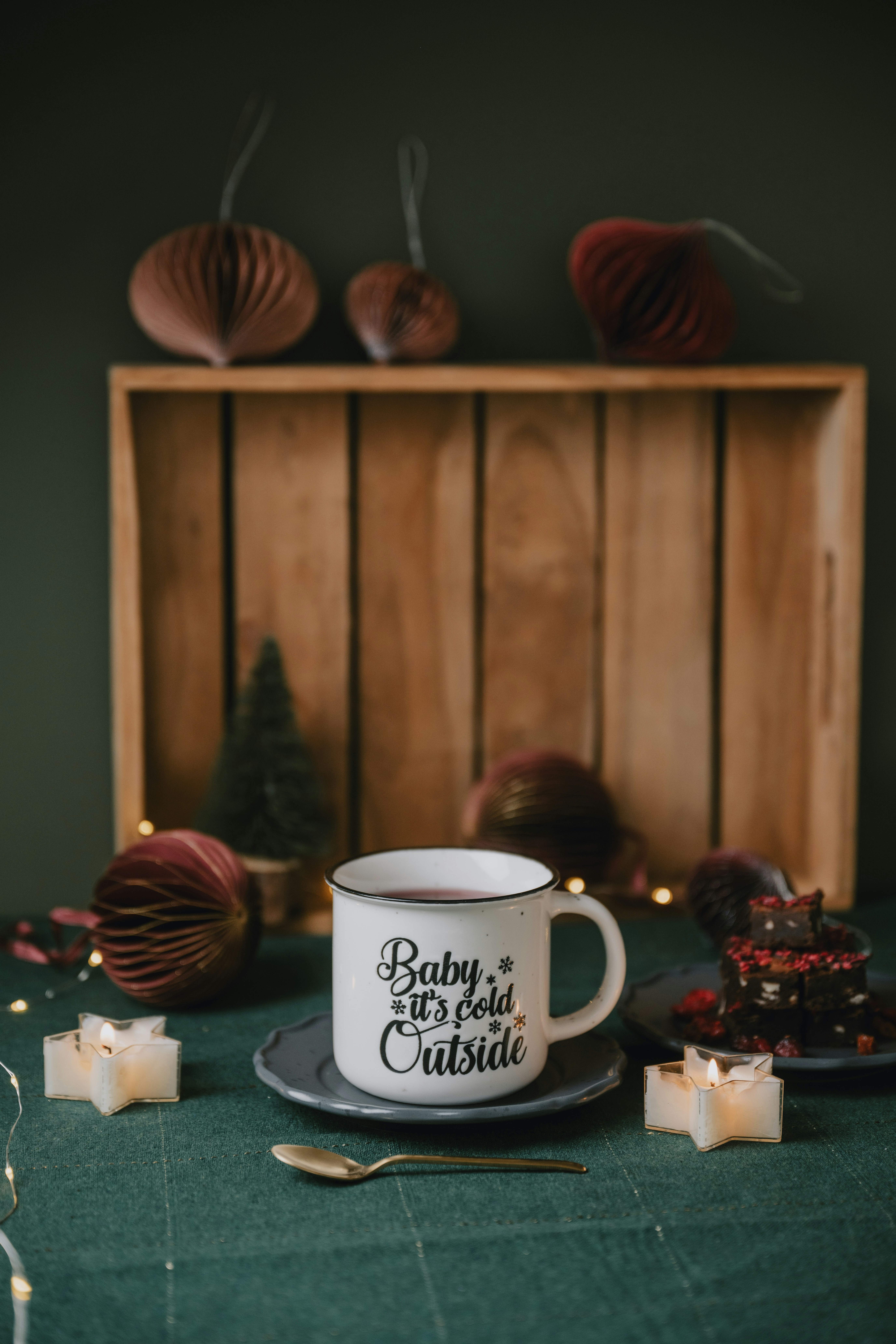 Cozy Holiday Mug Amid Rustic Christmas Setup